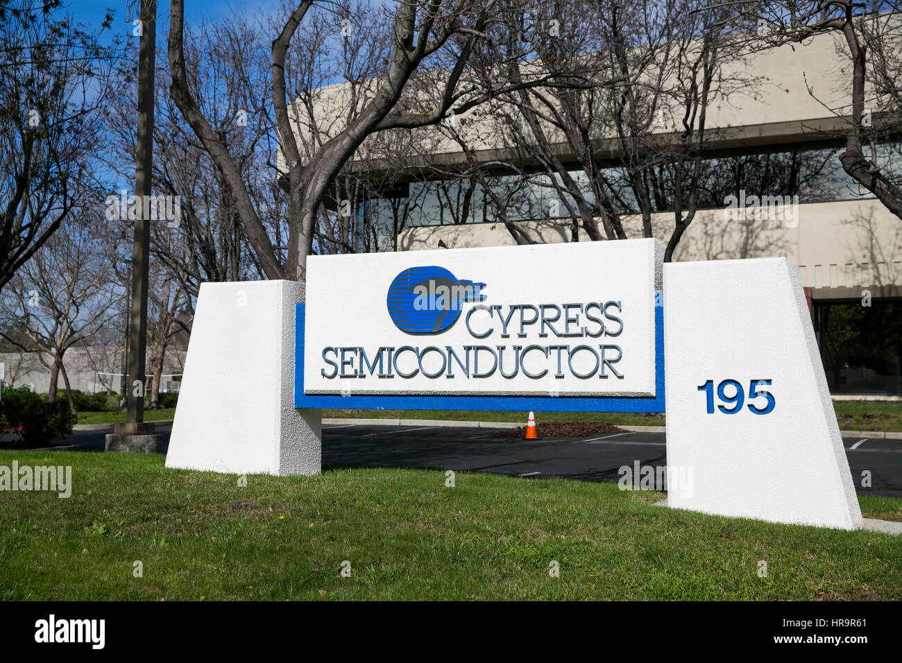 A logo sign outside of the headquarters of Cypress Semiconductor in San ...