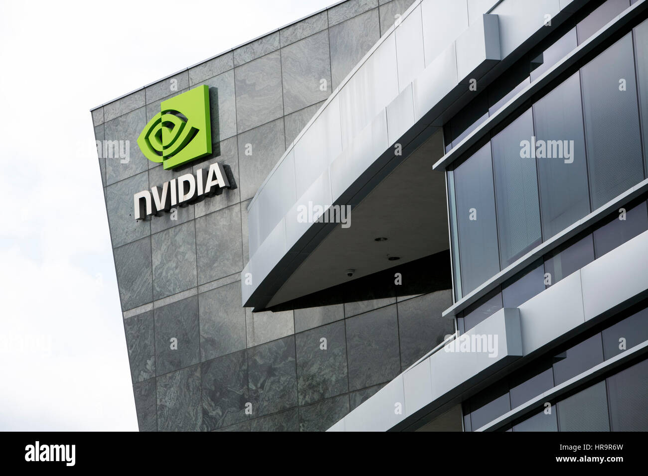 A logo sign outside of the headquarters of the Nvidia Corporation in ...