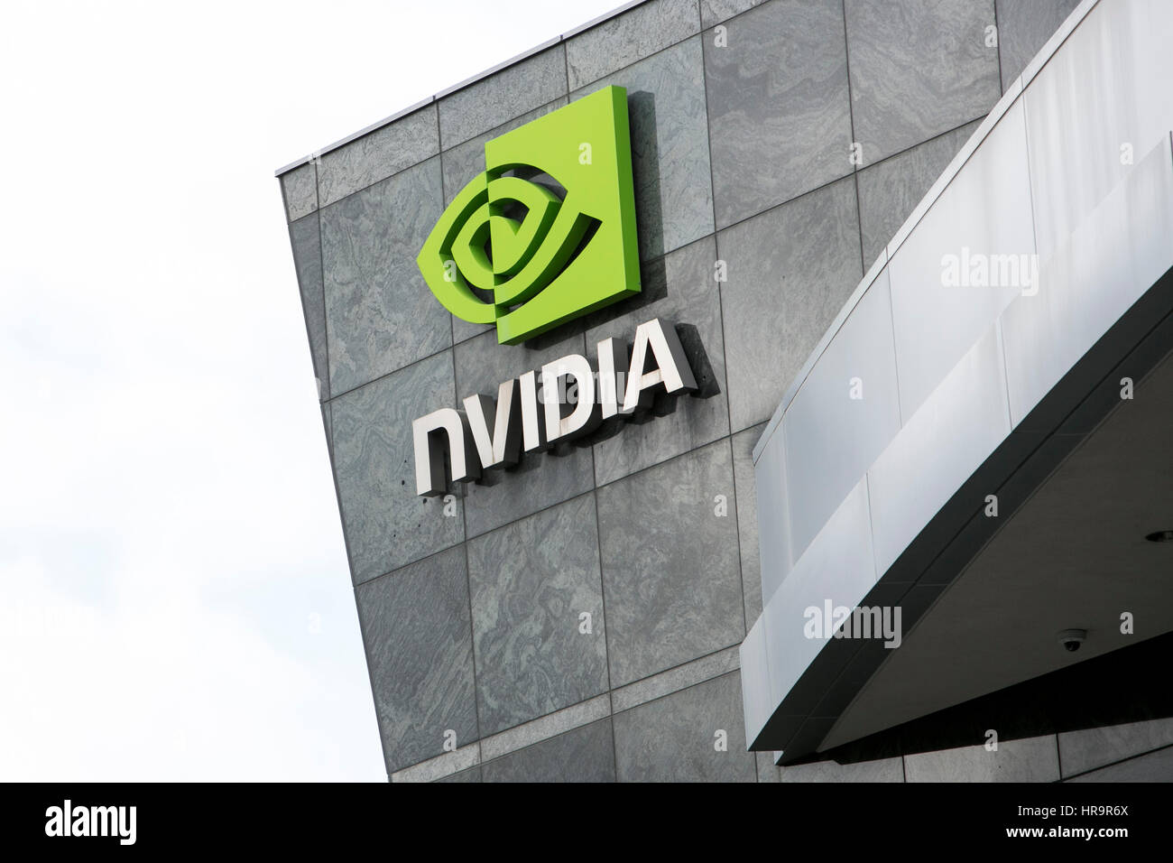A logo sign outside of the headquarters of the Nvidia Corporation in ...