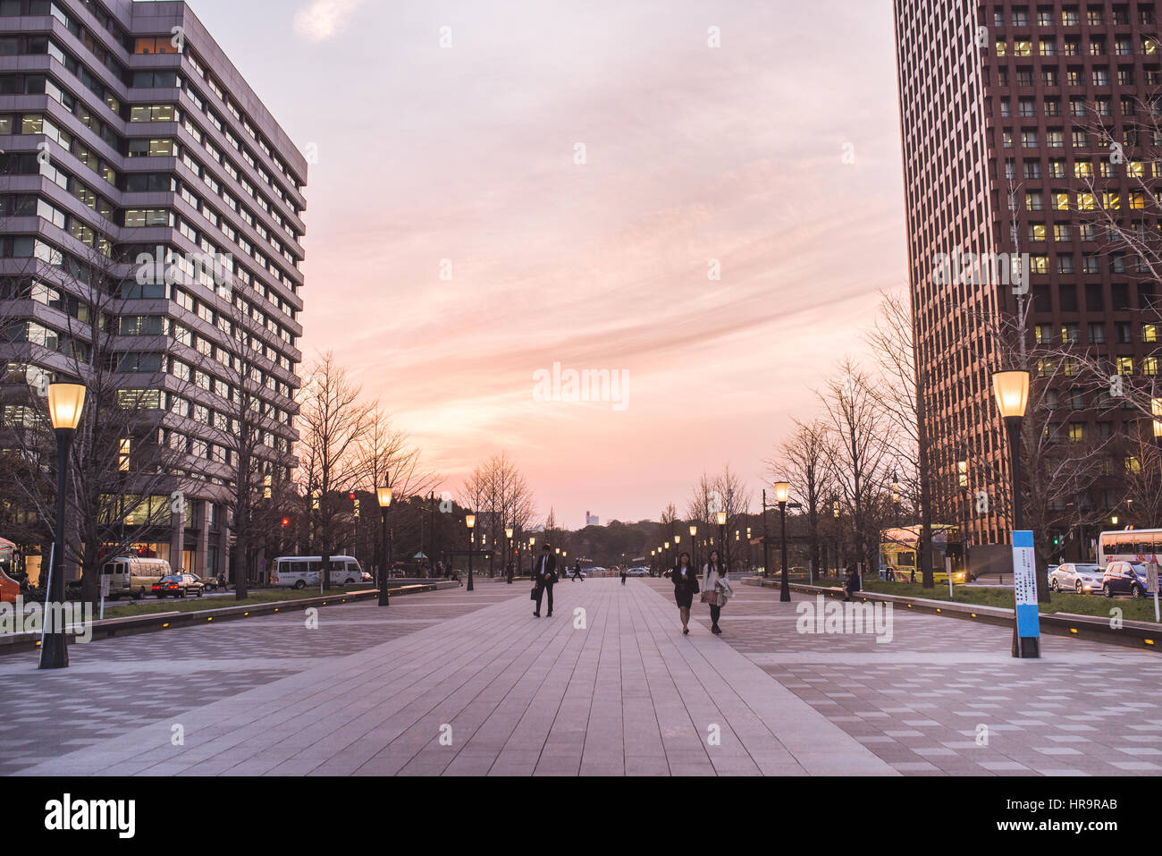 TOKYO, JAPAN - MARCH 30: Sunset at Walkway in front of Tokyo Station ...
