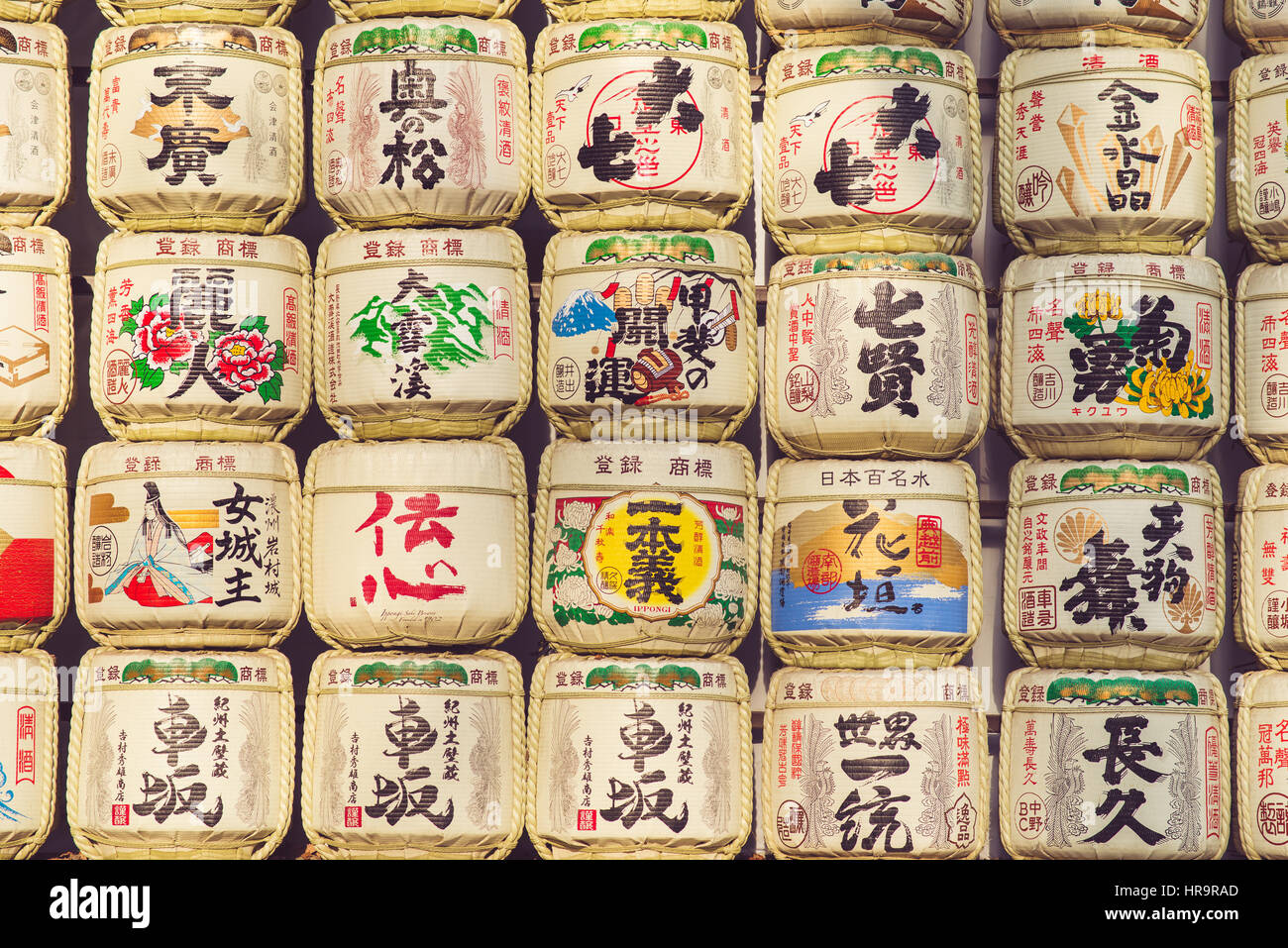 TOKYO, JAPAN - MARCH 30: A collection of Japanese sake barrels stacked ...