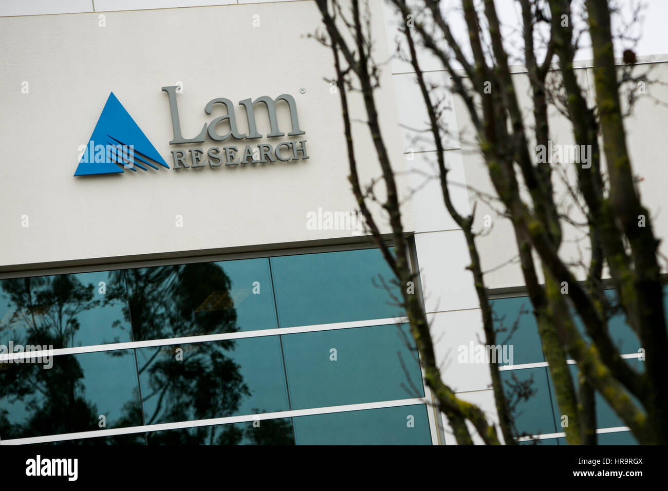 A logo sign outside of a facility occupied by the Lam Research ...