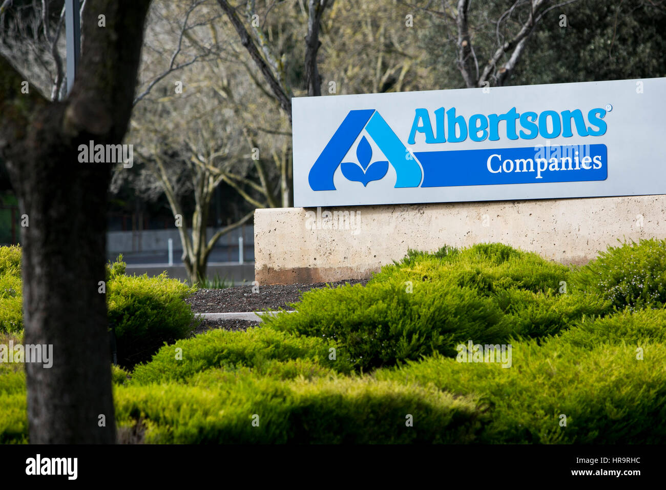 A logo sign outside of a facility occupied by Albertsons Companies Inc ...