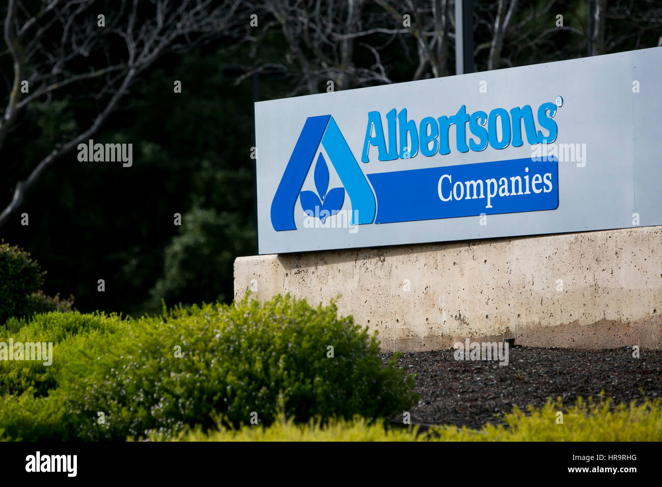 A logo sign outside of a facility occupied by Albertsons Companies Inc ...
