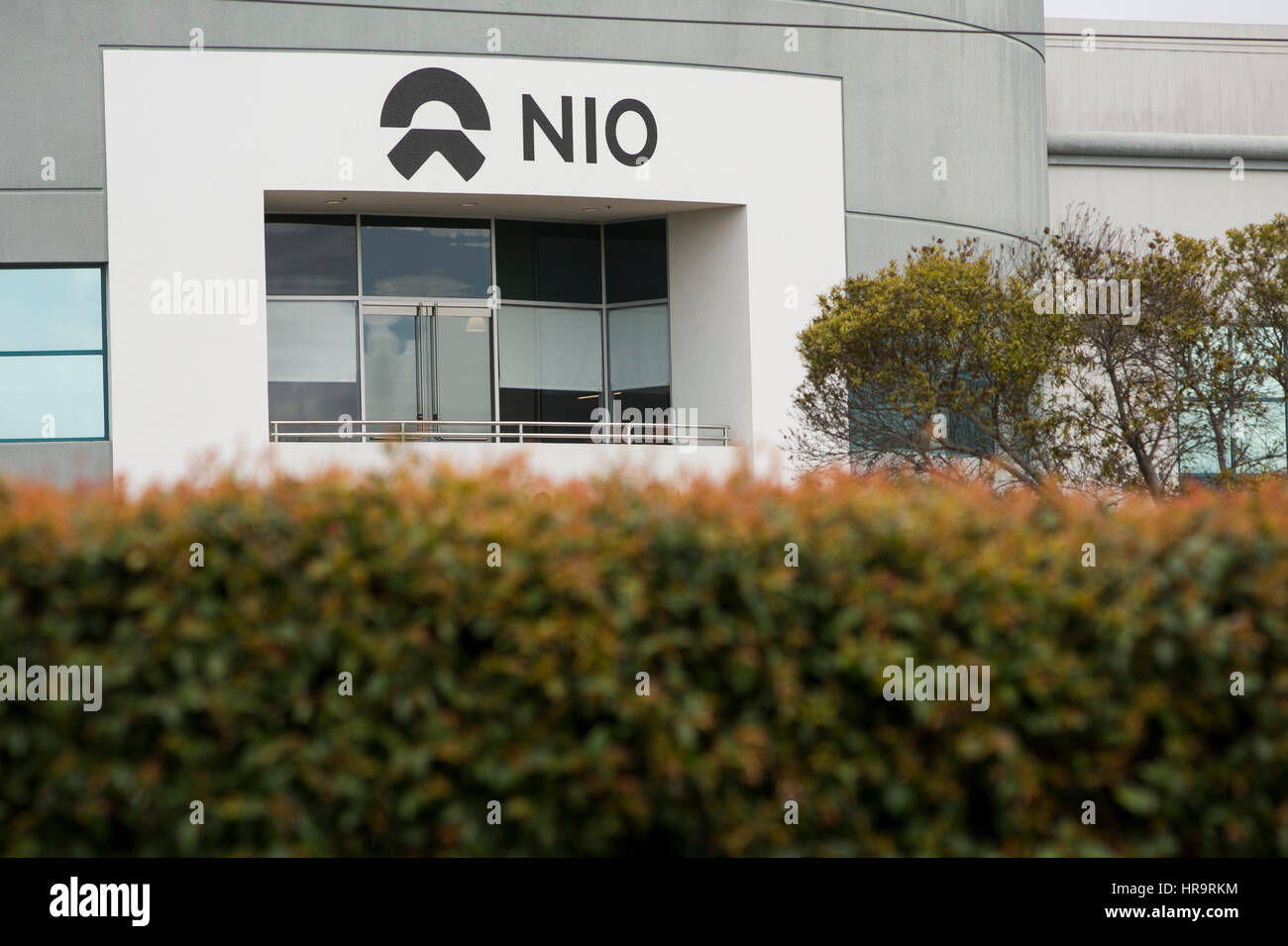 A logo sign outside of a facility occupied by NIO and NextEV in San ...
