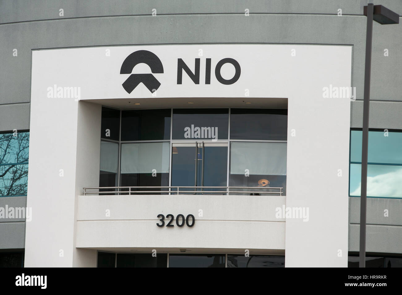 A logo sign outside of a facility occupied by NIO and NextEV in San ...