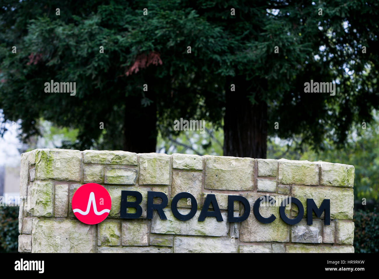 A logo sign outside of a facility occupied by Broadcom Limited in San ...