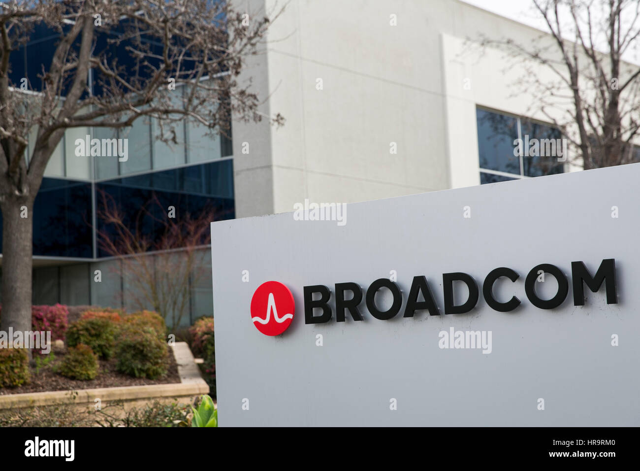 A logo sign outside of a facility occupied by Broadcom Limited in San ...