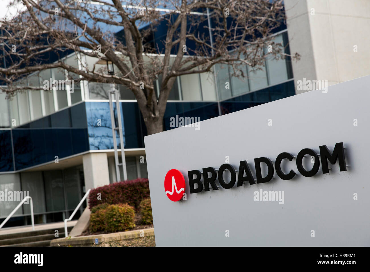 A logo sign outside of a facility occupied by Broadcom Limited in San ...