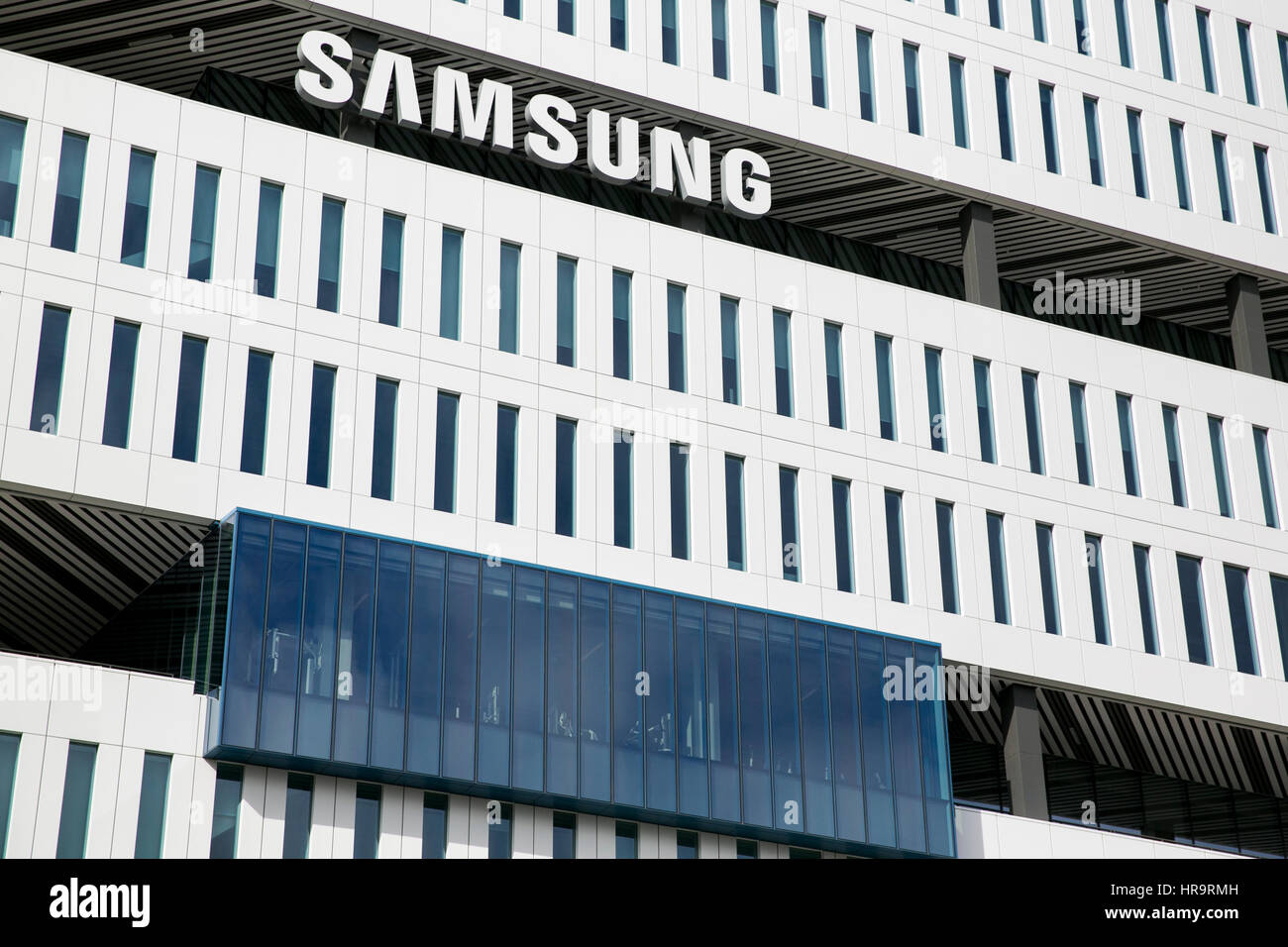 A logo sign outside of a facility occupied by Samsung Electronics ...