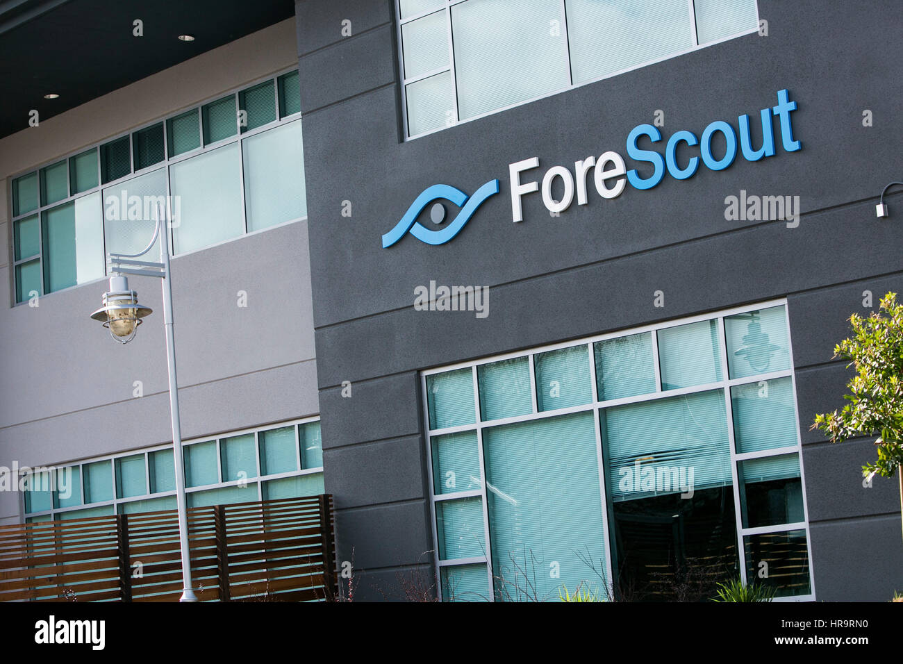 A logo sign outside of a facility occupied by ForeScout Technologies ...