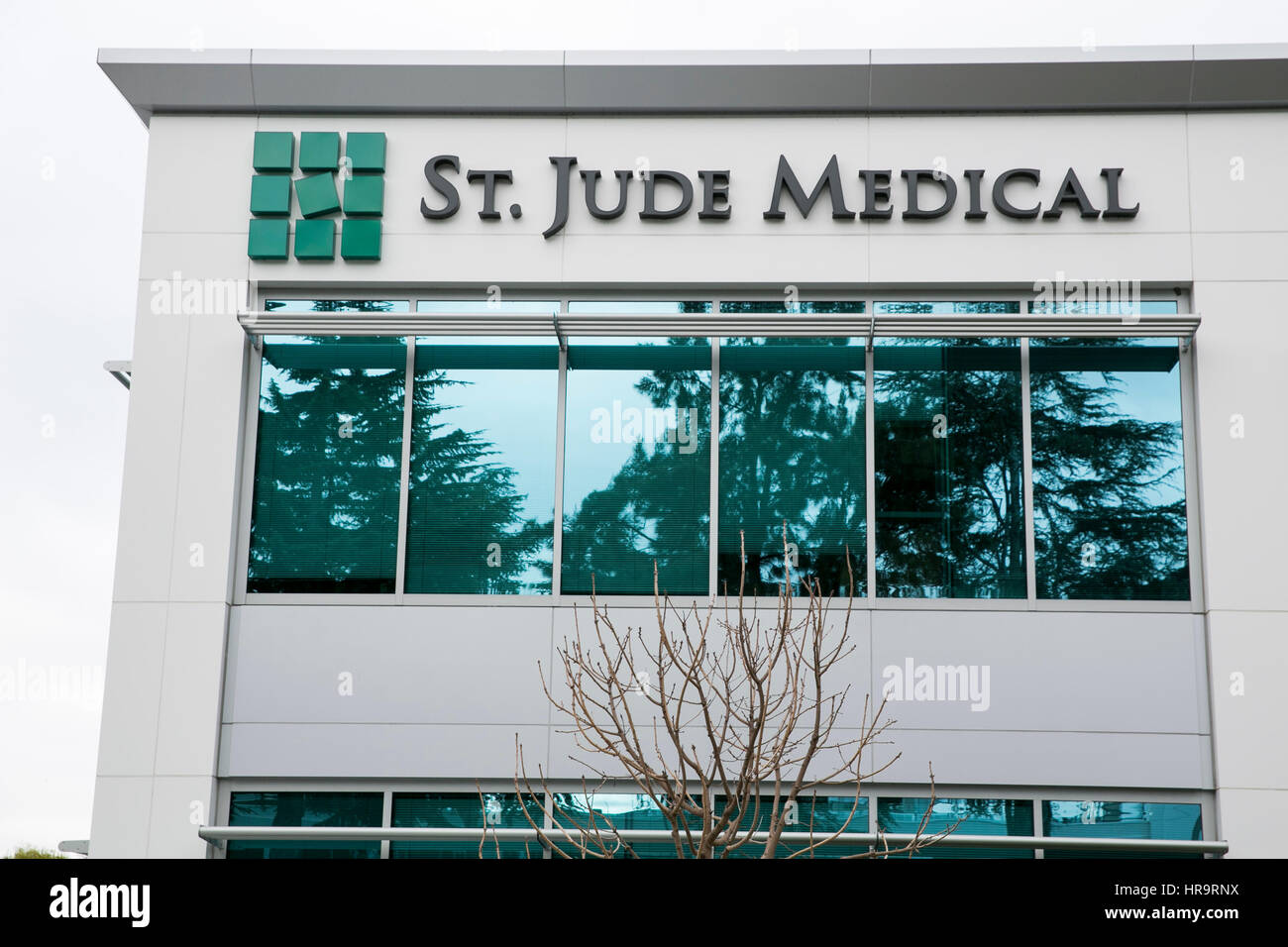 A logo sign outside of a facility occupied by St. Jude Medical, Inc ...
