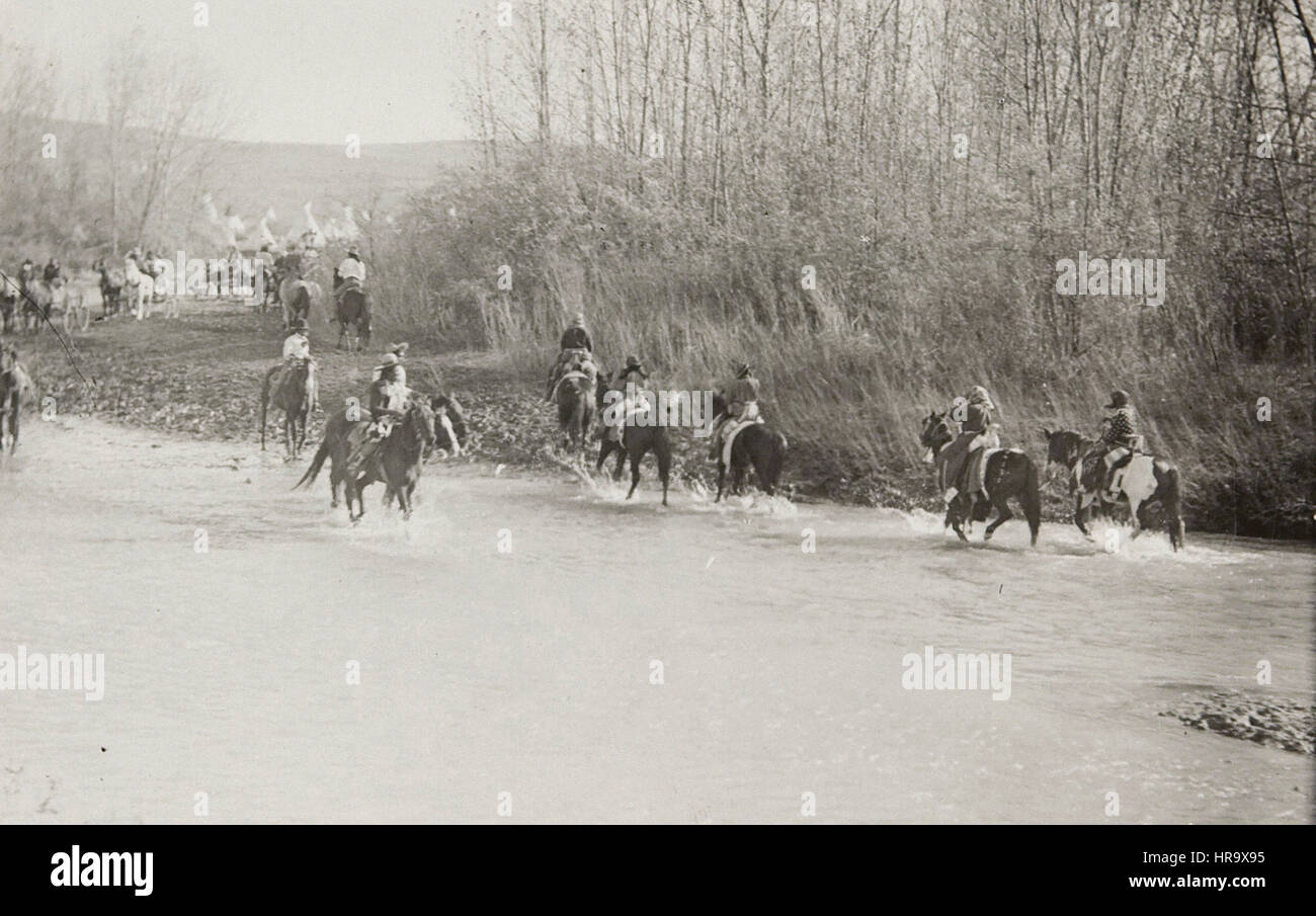 Untitled (Native Americans fording river Stock Photo - Alamy