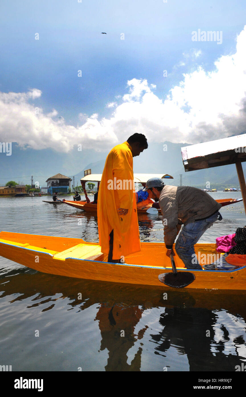 Yellow Shikara with Yellow Dressed Man, Kashmir (Photo Copyright © by ...