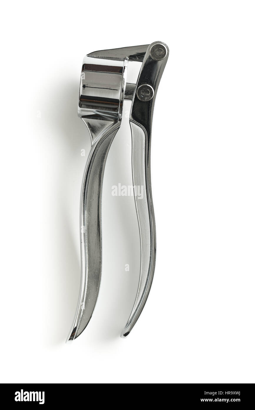 Metal garlic press utensil isolated on white background Stock Photo - Alamy