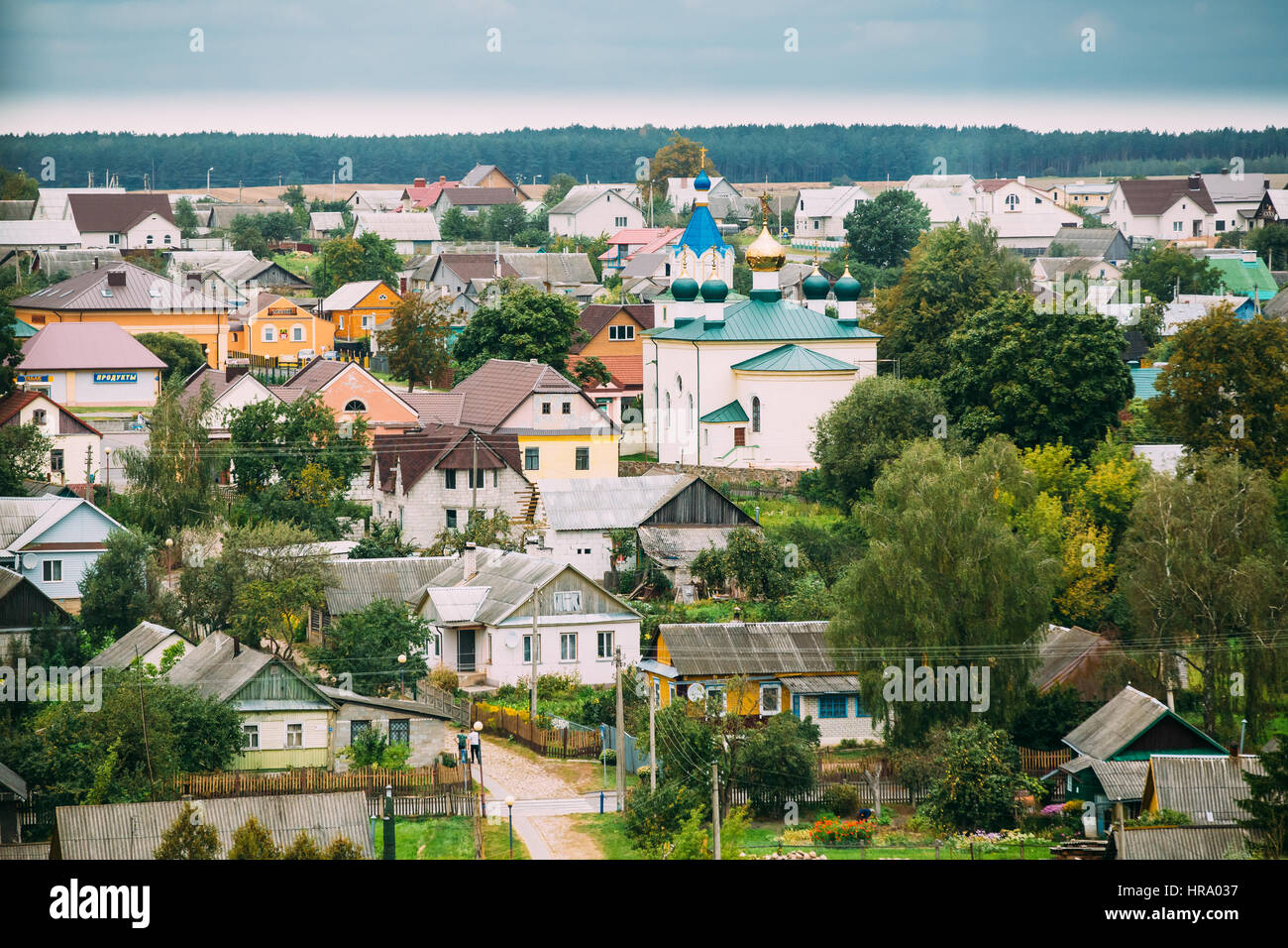 Mir, Belarus. Landscape Of Village Houses And Orthodox Church Of The ...