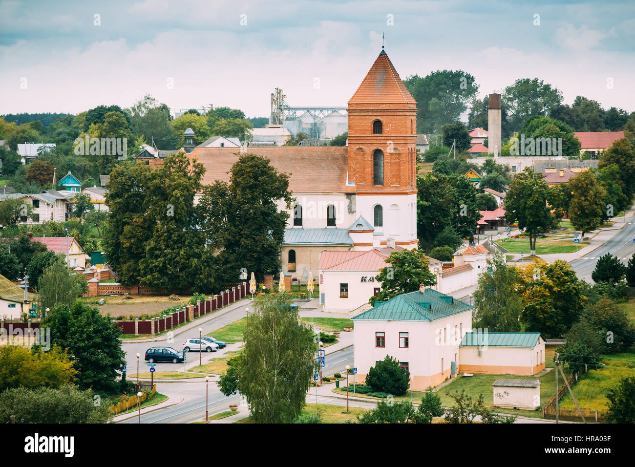 Mir, Belarus. Landscape Of Village Houses And Saint Nicolas Roman ...