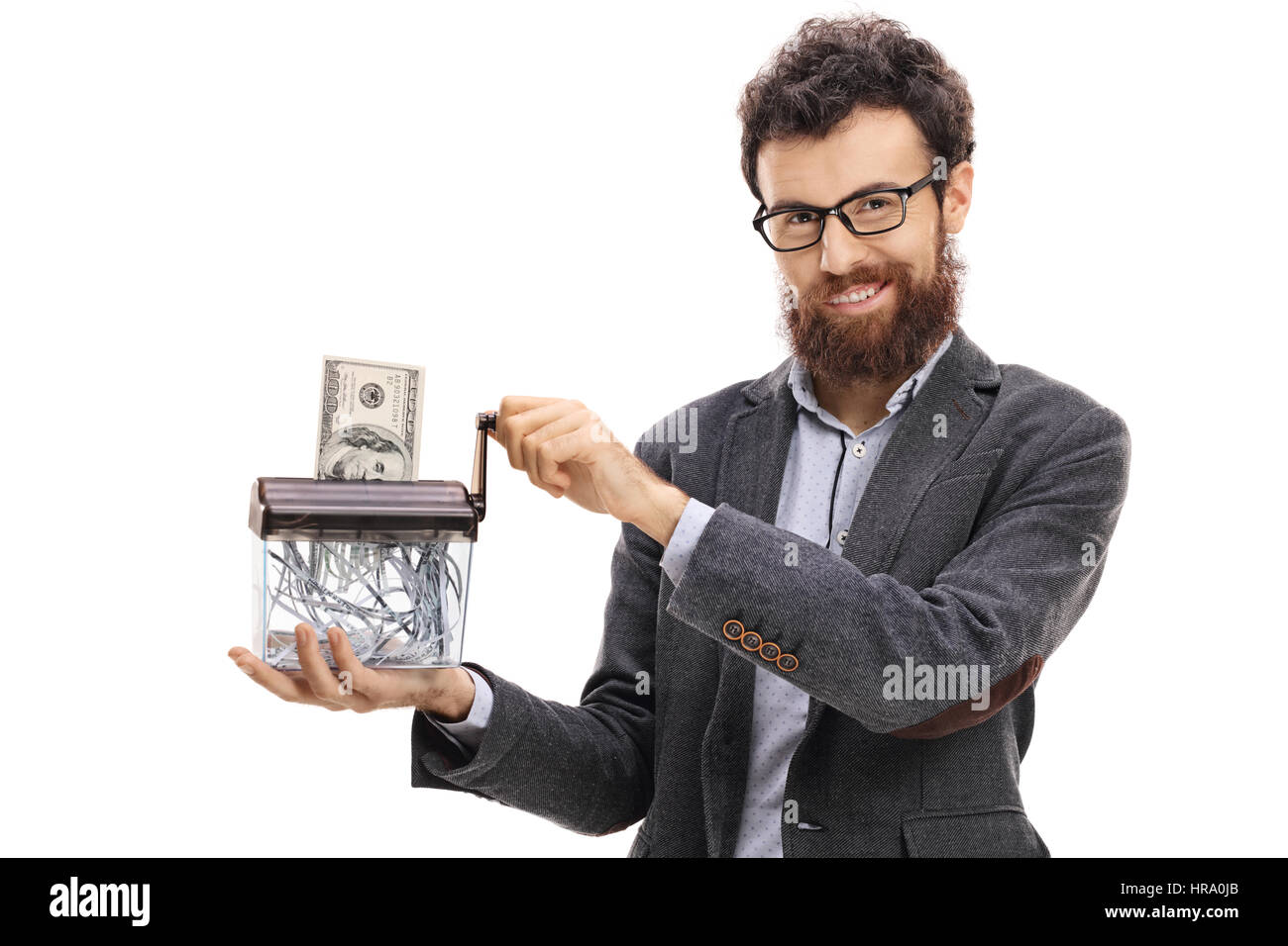 Man destroying a dollar banknote in a paper shredder isolated on white ...