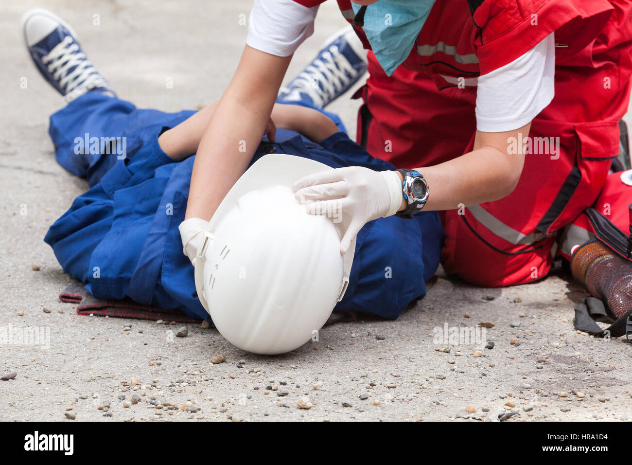 First aid after workplace incident Stock Photo - Alamy