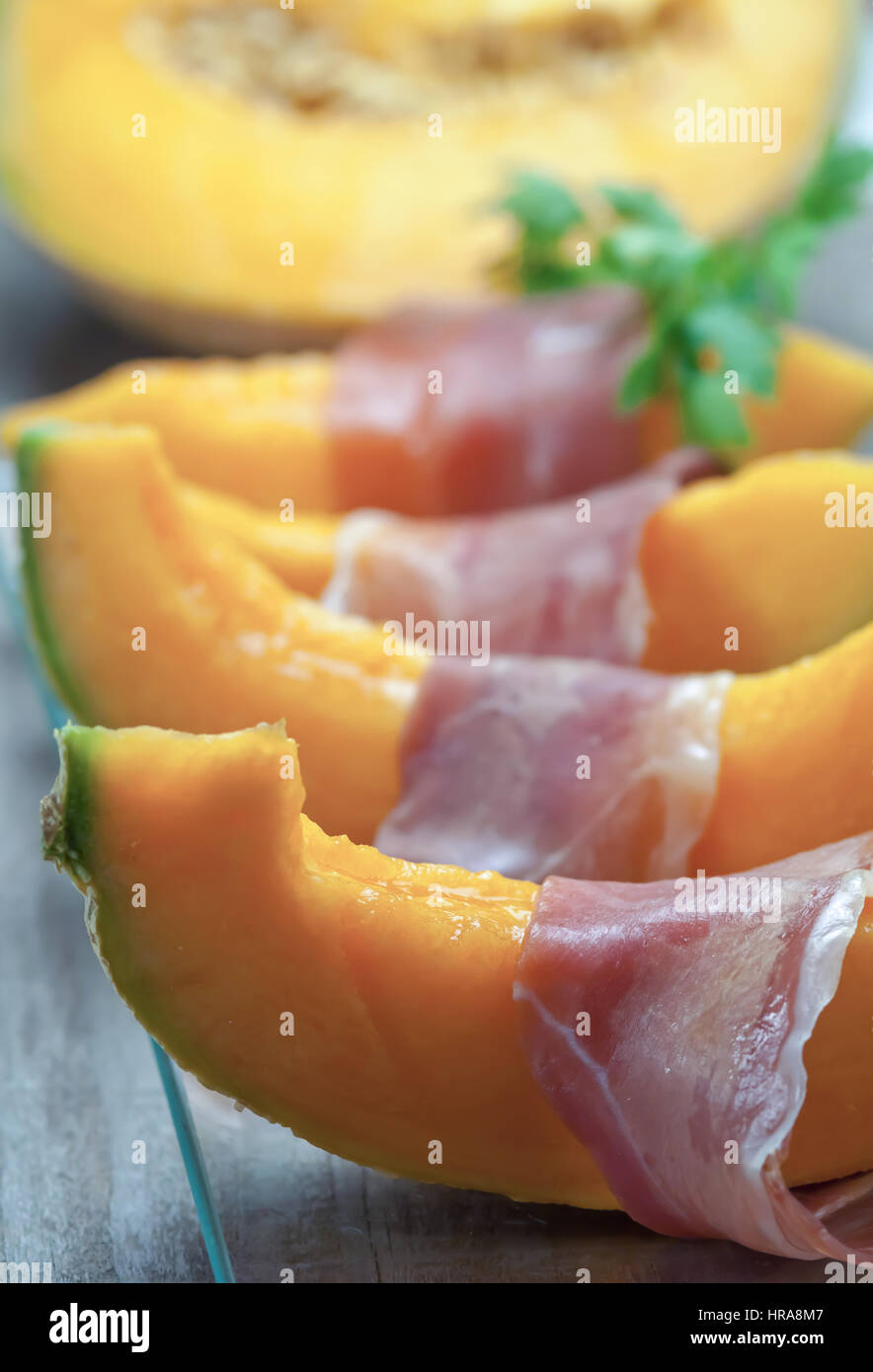 Fresh ham and melon closeup Stock Photo - Alamy