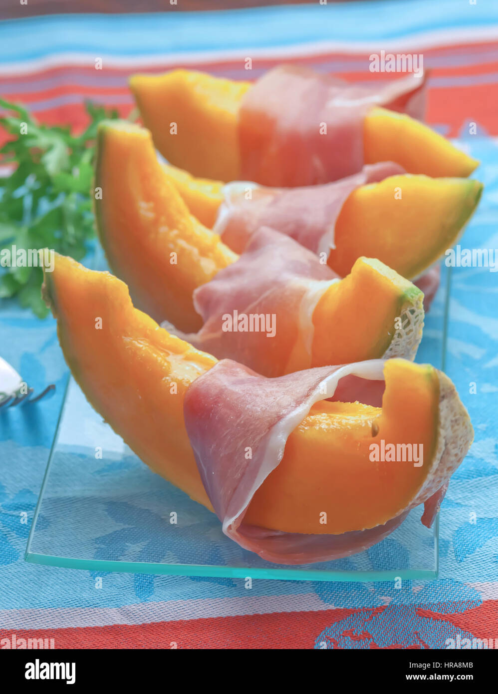 Ham and fresh melon closeup Stock Photo - Alamy