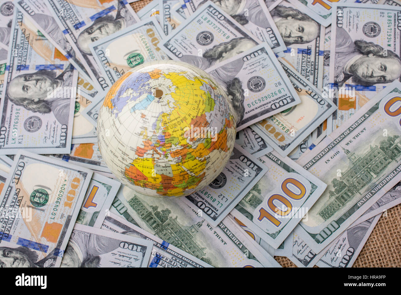 Stack banknotes globe hi-res stock photography and images - Alamy