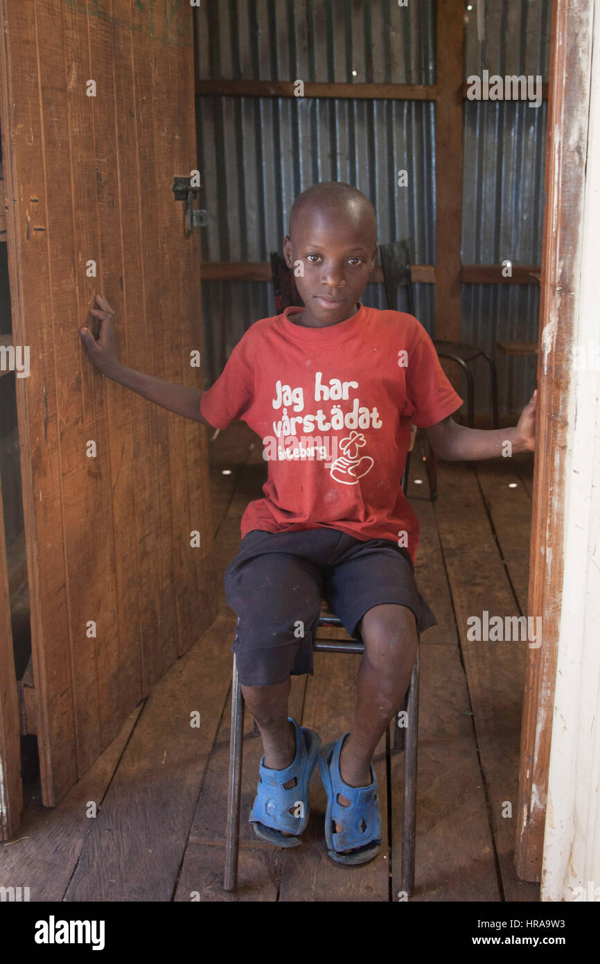 Portrait of a young boy in an orphanage in kibera slum, Nairobi, Kenya ...