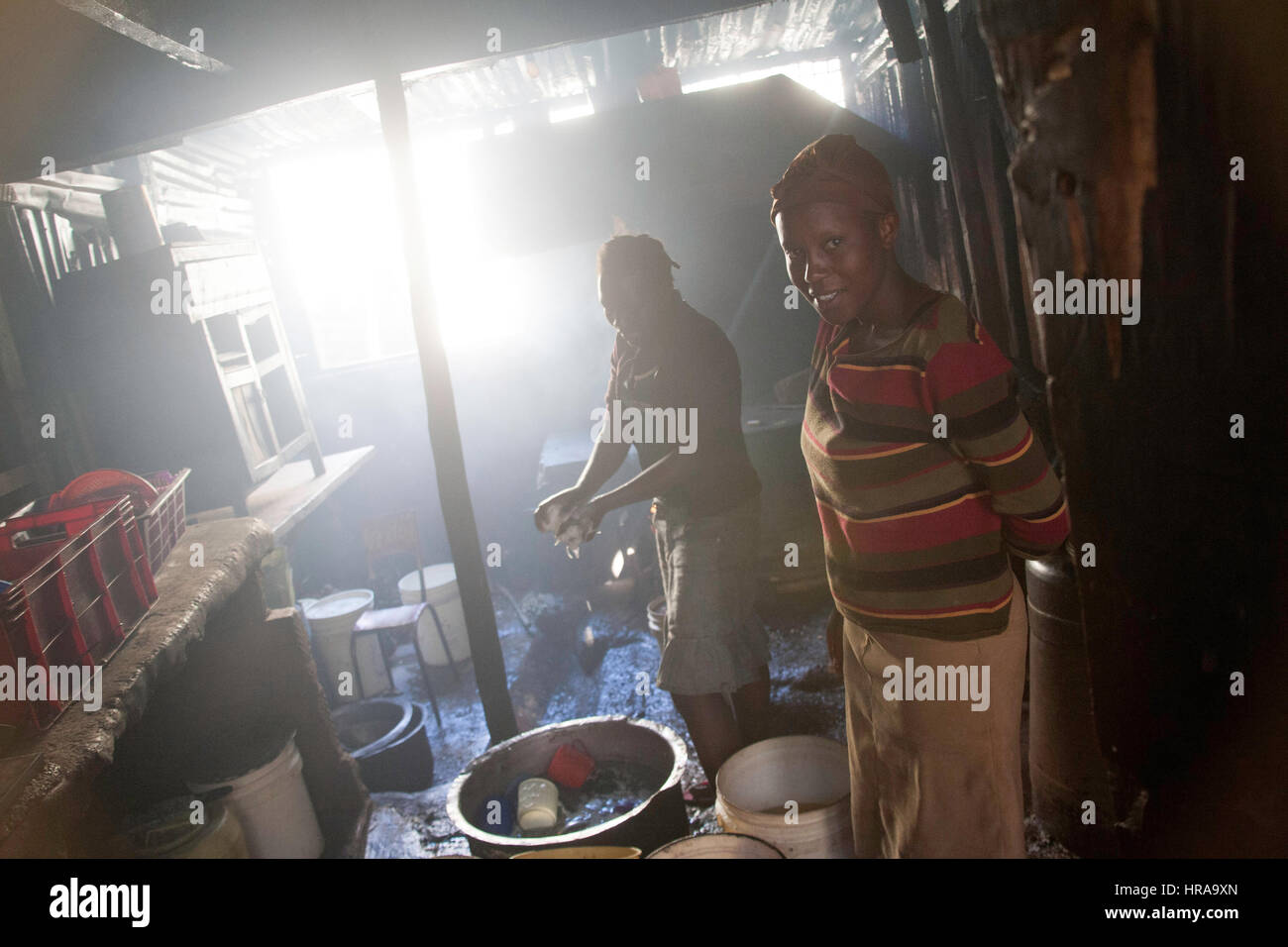 Women preparing food in the kitchens of the orphanage, Kibera slums ...