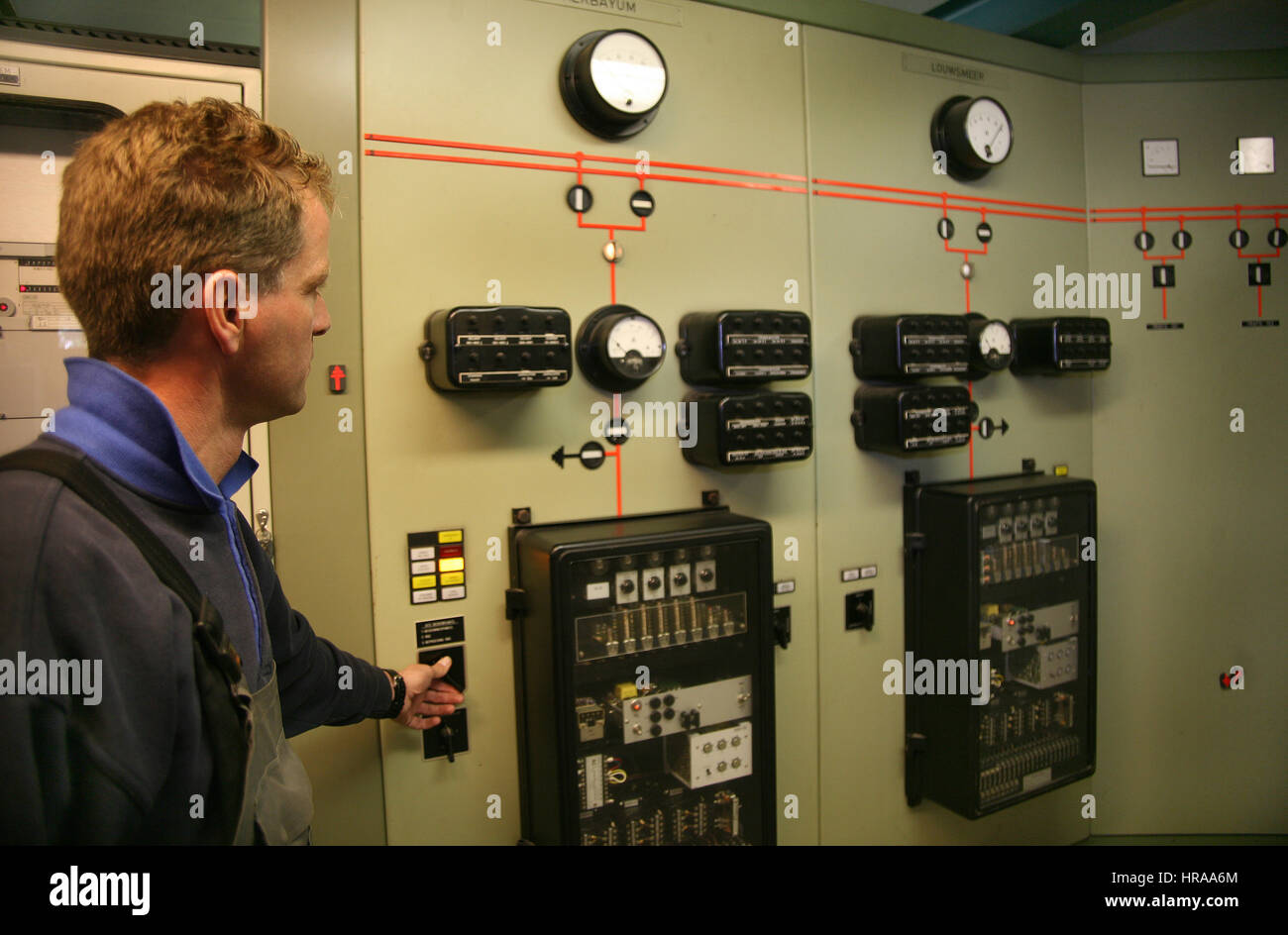 Electricity distribution network operator hi-res stock photography and ...