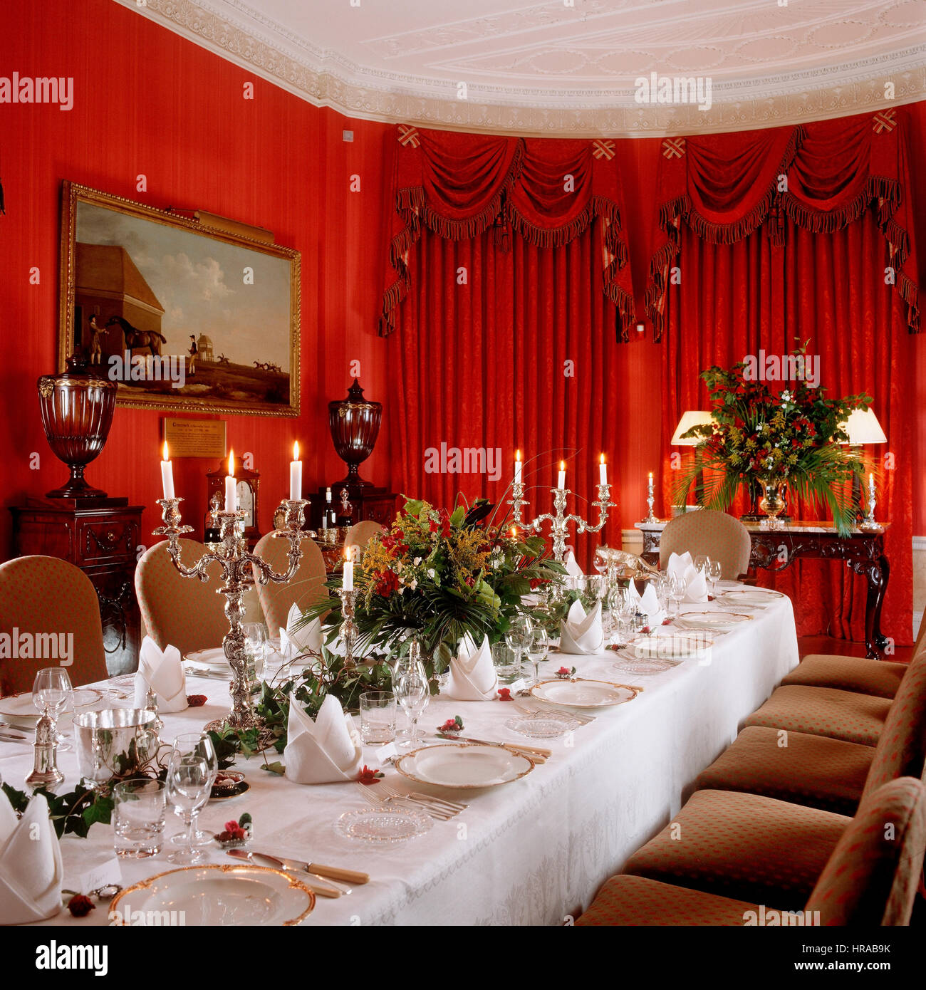 A dining room with lit candles Stock Photo - Alamy