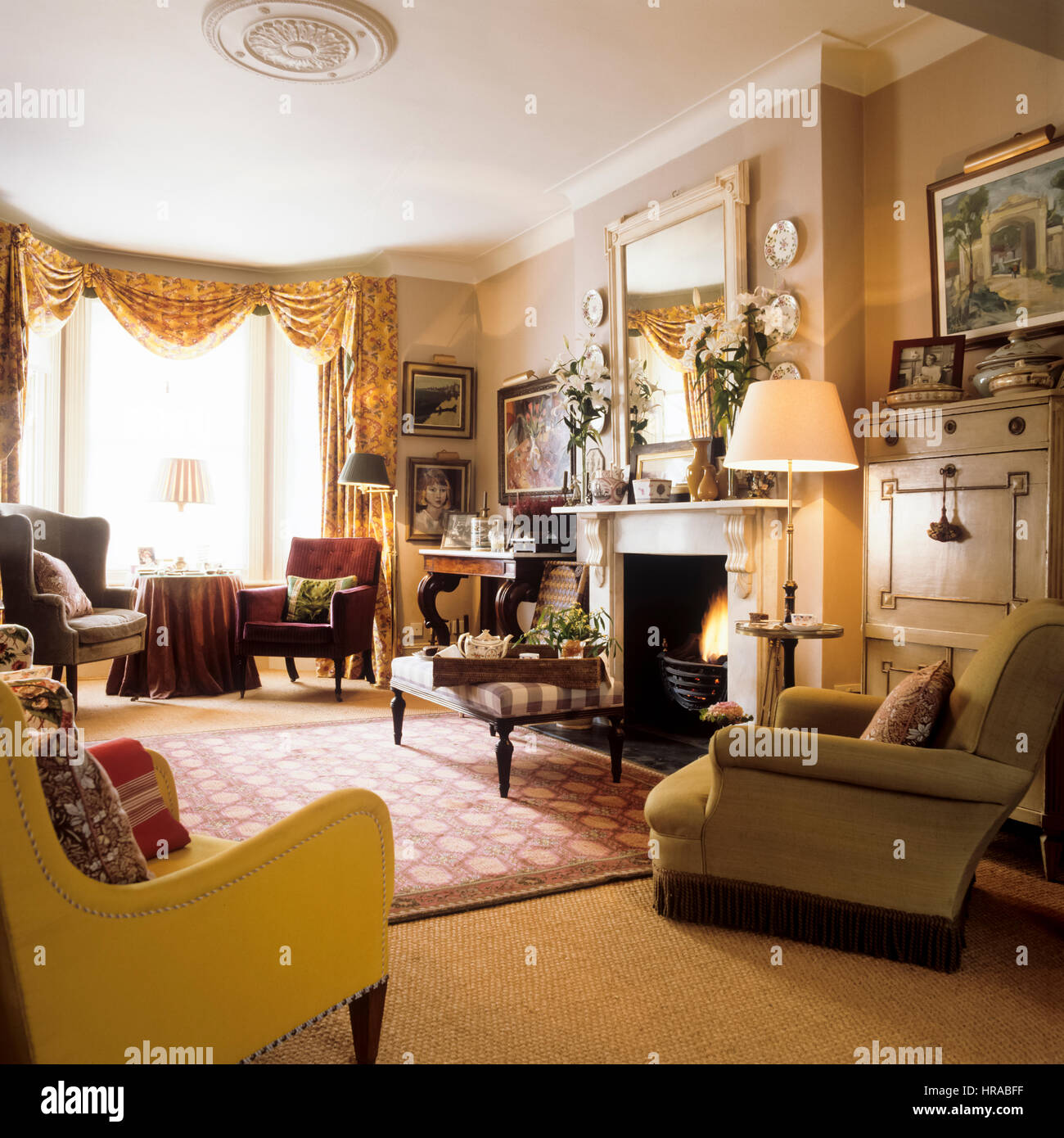 Living room with a patterned rug Stock Photo - Alamy