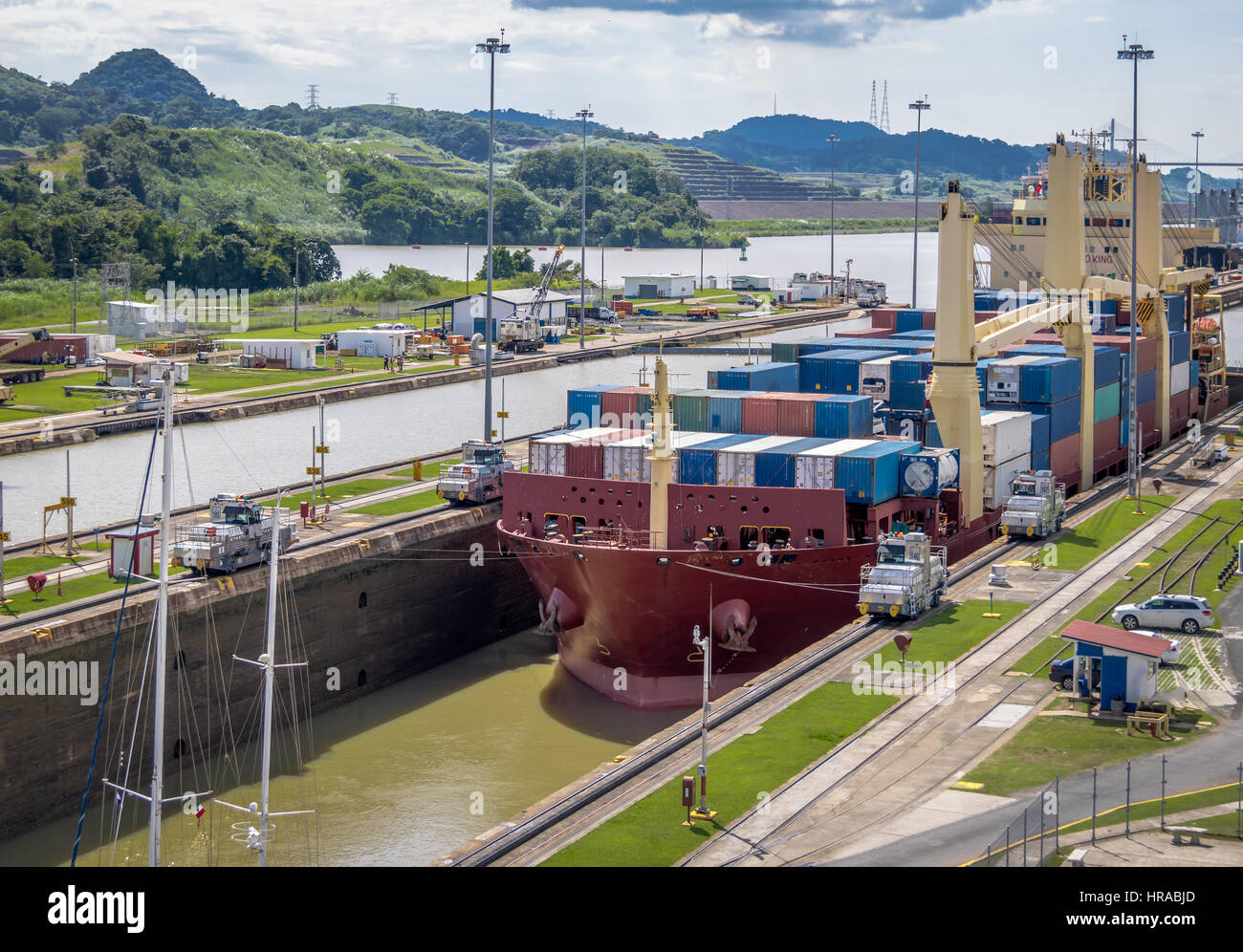Ship crossing Panama Canal being lowered at Miraflores Locks - Panama ...