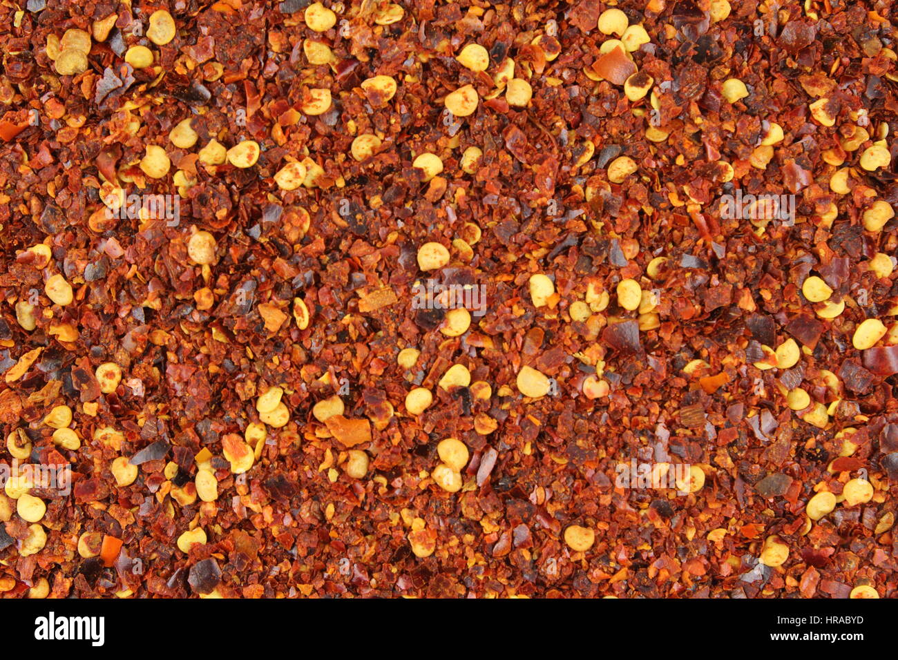 crushed red pepper flakes closeup as a food background texture Stock ...