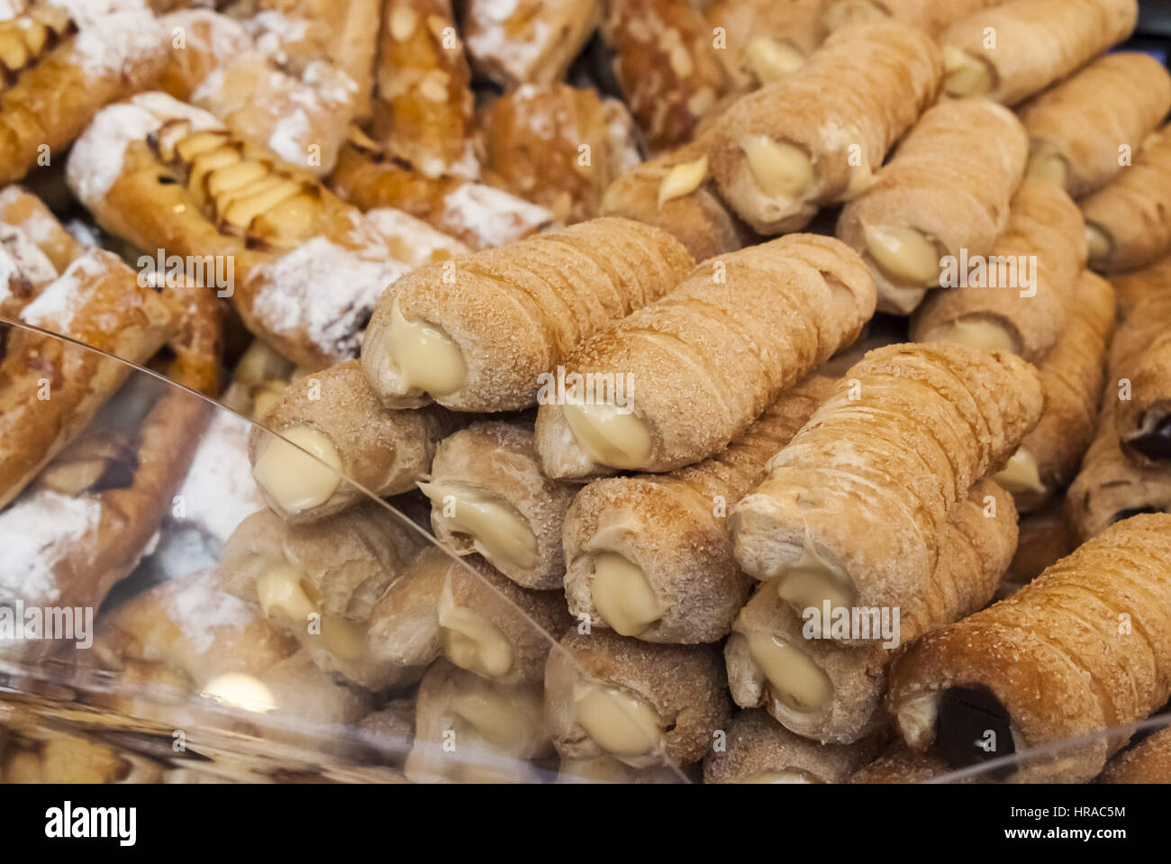 Cannoli with custard Stock Photo - Alamy