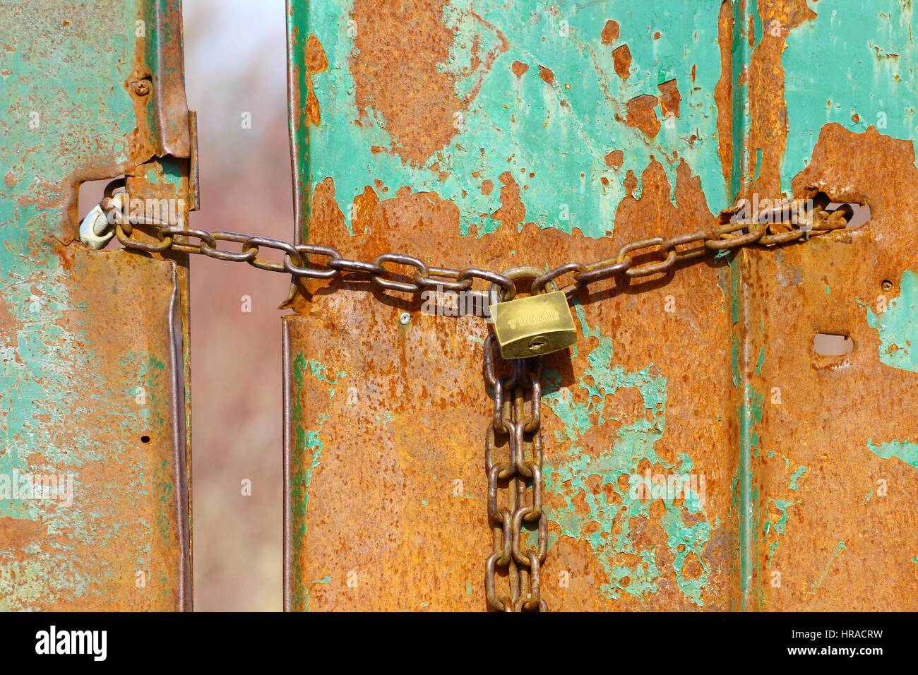 Old rusty door with padlock Stock Photo - Alamy