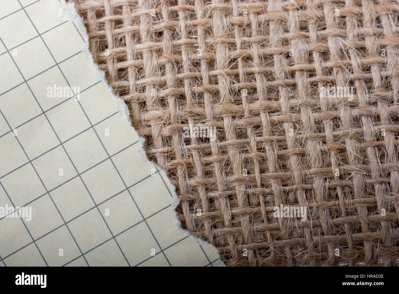 Piece of torn paper placed on a linen canvas Stock Photo - Alamy