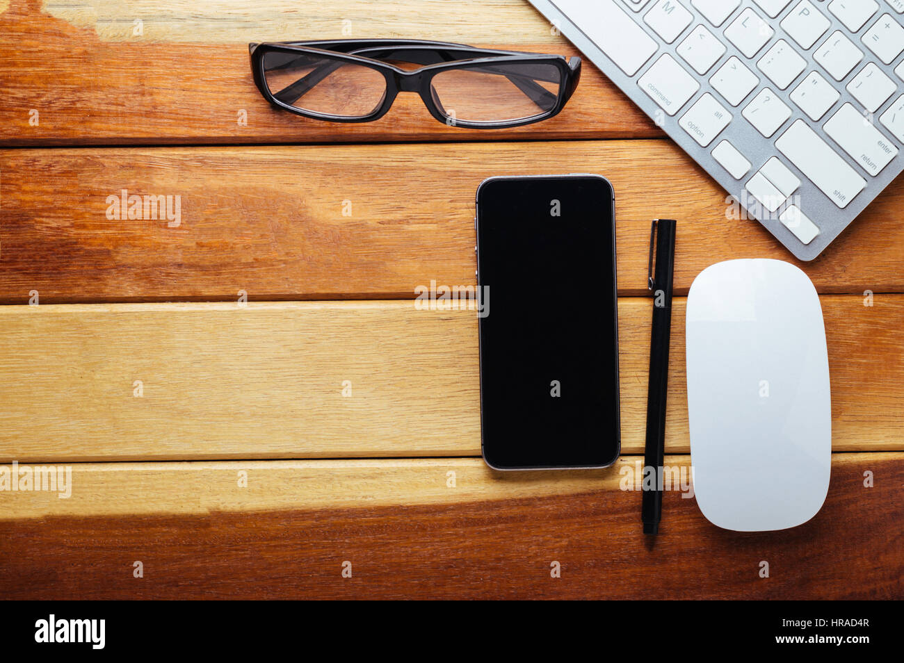 Office desk wood with computer, note book,phone concept in wood ...