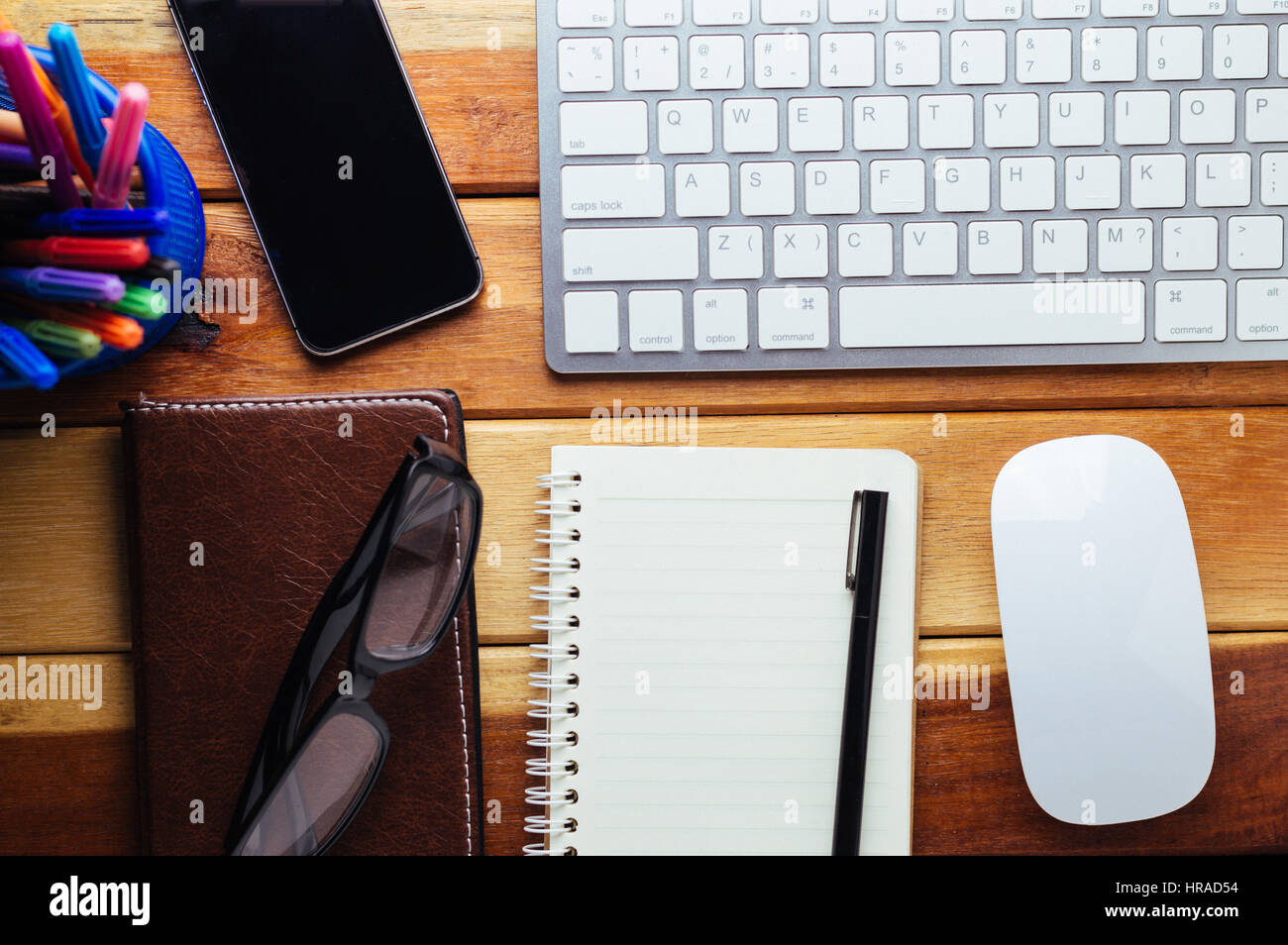 Office desk wood with computer, note book,phone concept in wood ...