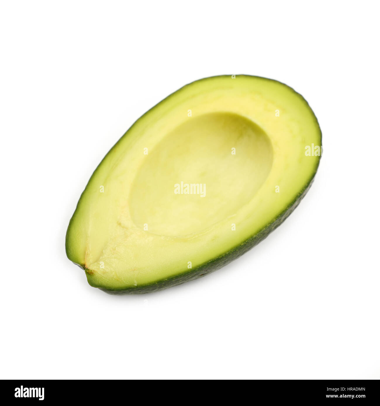 One fresh green ripe avocado (Persea gratissima) half without pit stone ...
