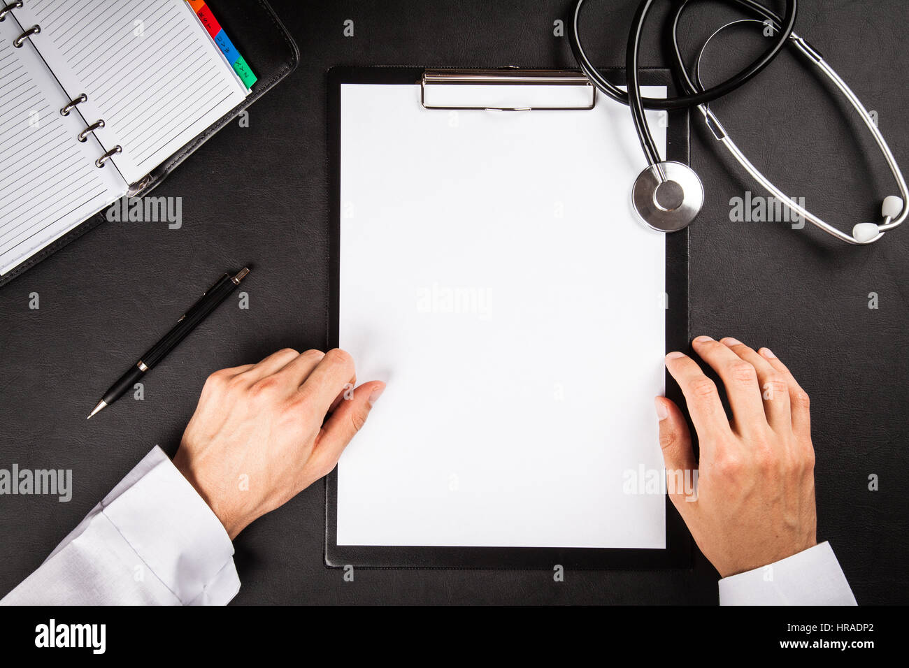 Doctor's working table Stock Photo - Alamy