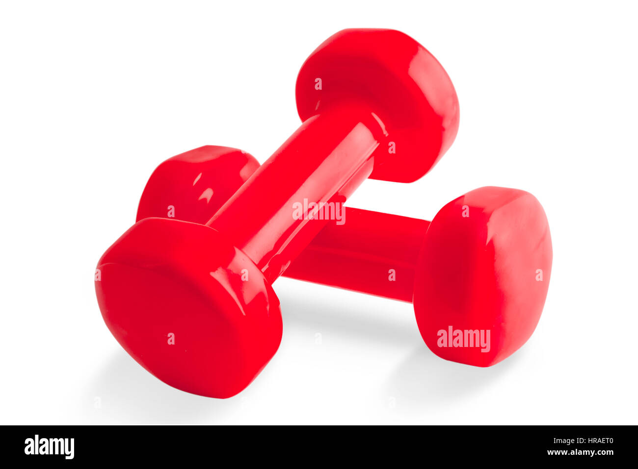 Two of red dumbbells, Isolated on white background Stock Photo - Alamy