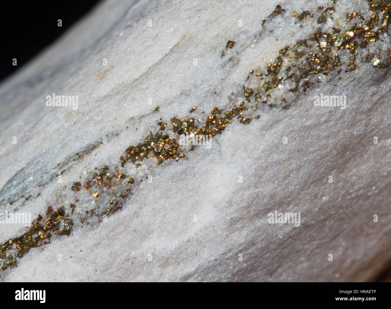 Brilliant white sugary dolomite matrix with seams of yellow pyrite ...
