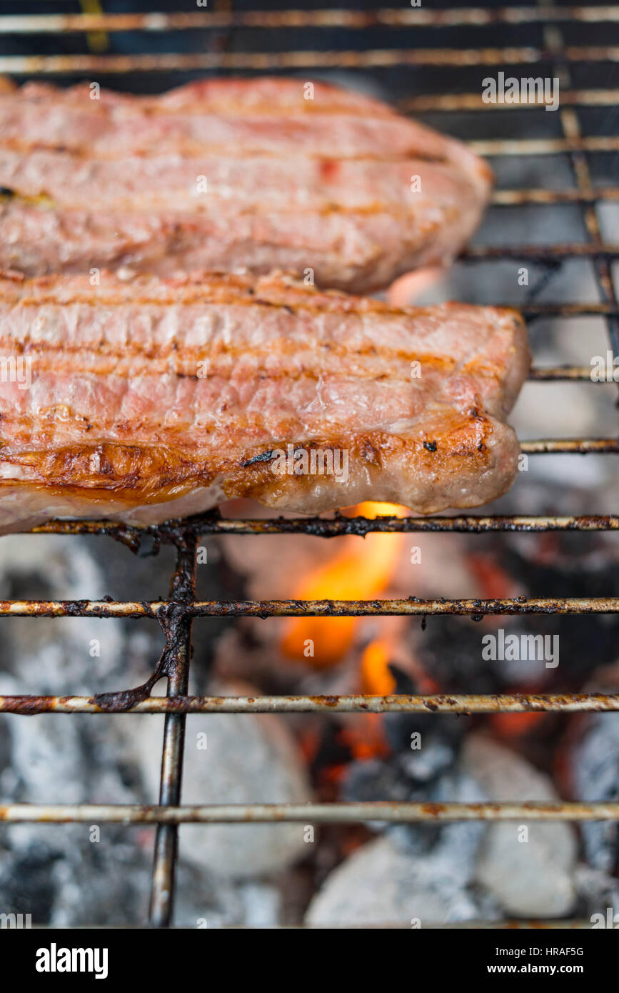 Meat on a braai or barbecue in Zimbabwe Stock Photo - Alamy