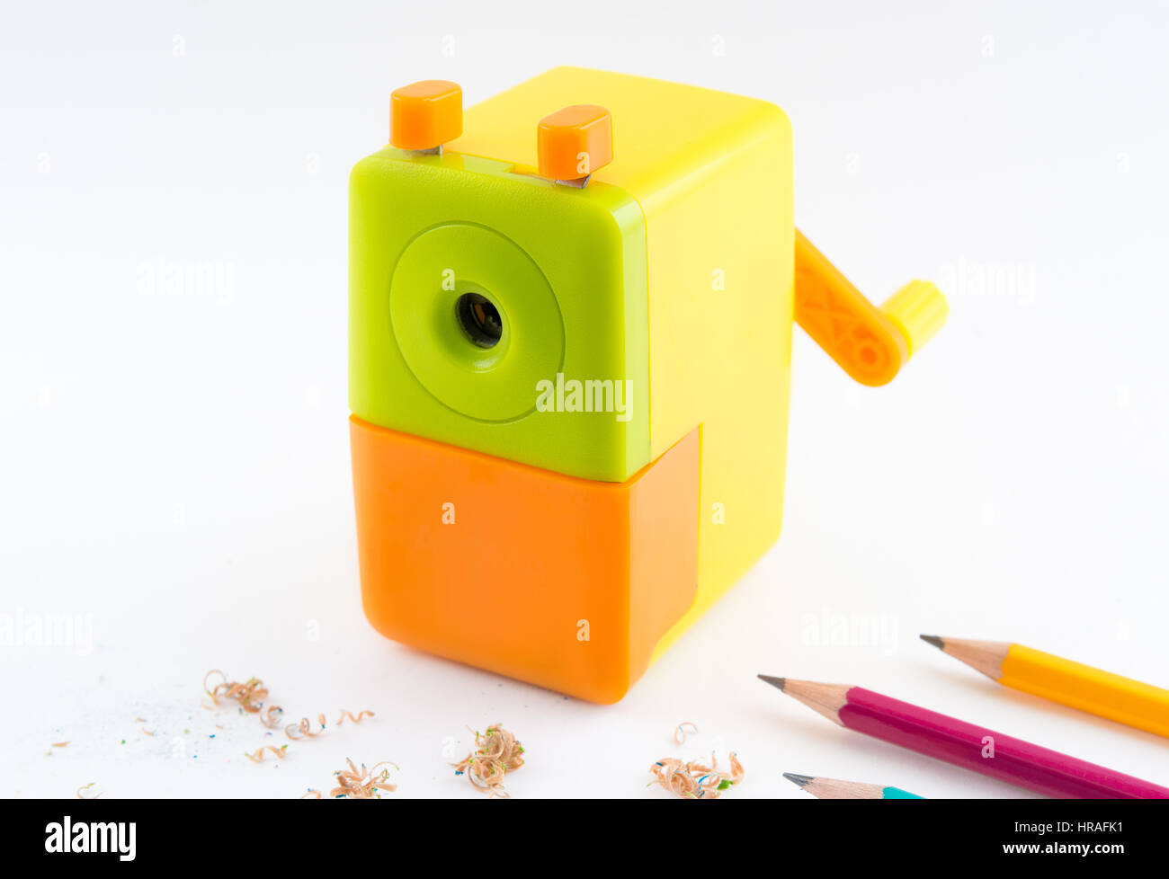colorful rotary pencil sharpener with pencil, on white background Stock ...