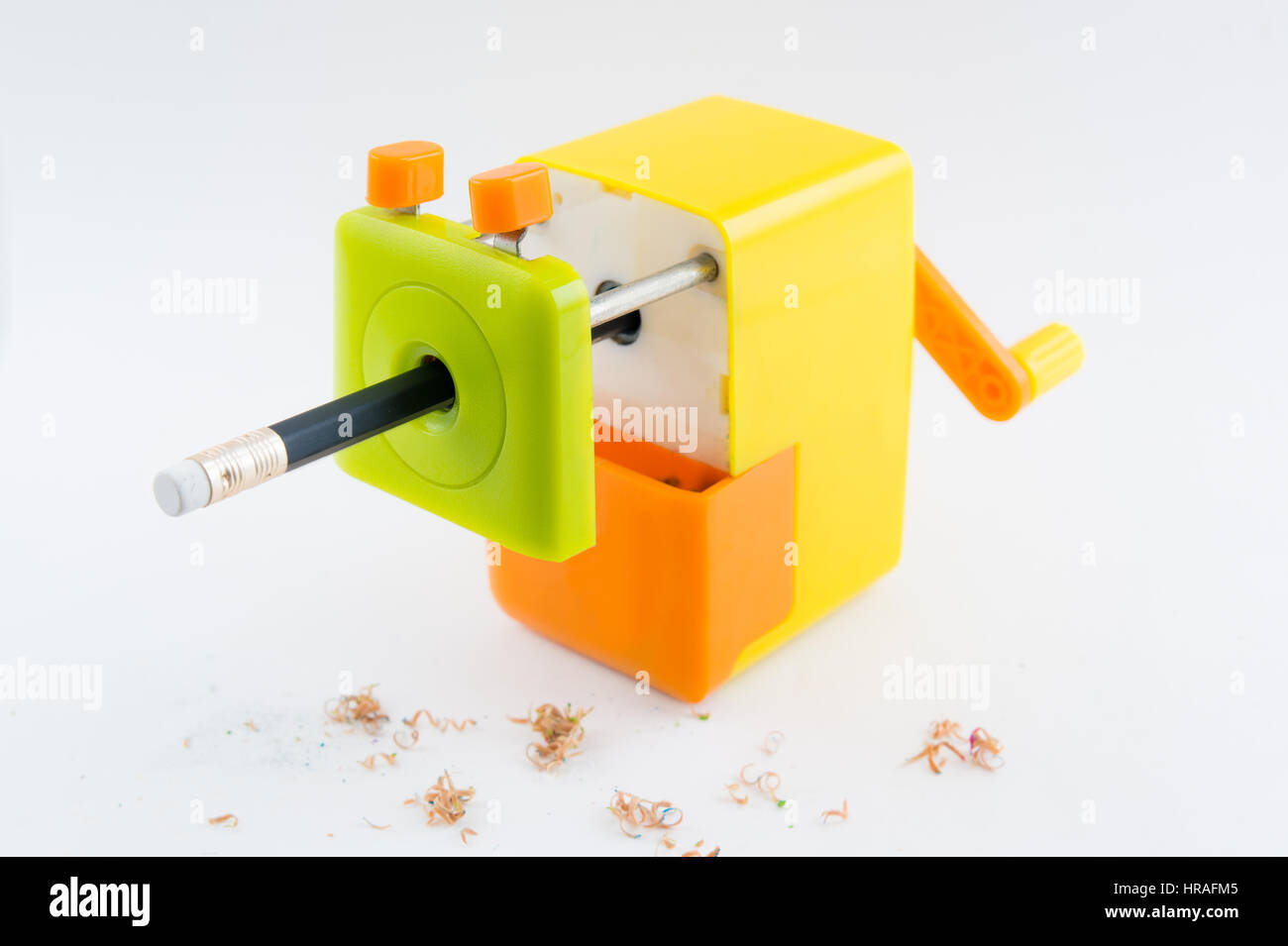 colorful rotary pencil sharpener with pencil, on white background Stock ...