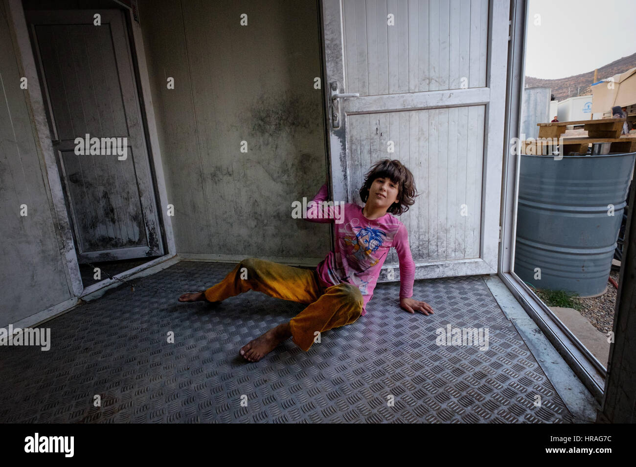 A mentally handicapped refugee girl age 9, chained to a toilet by the ...