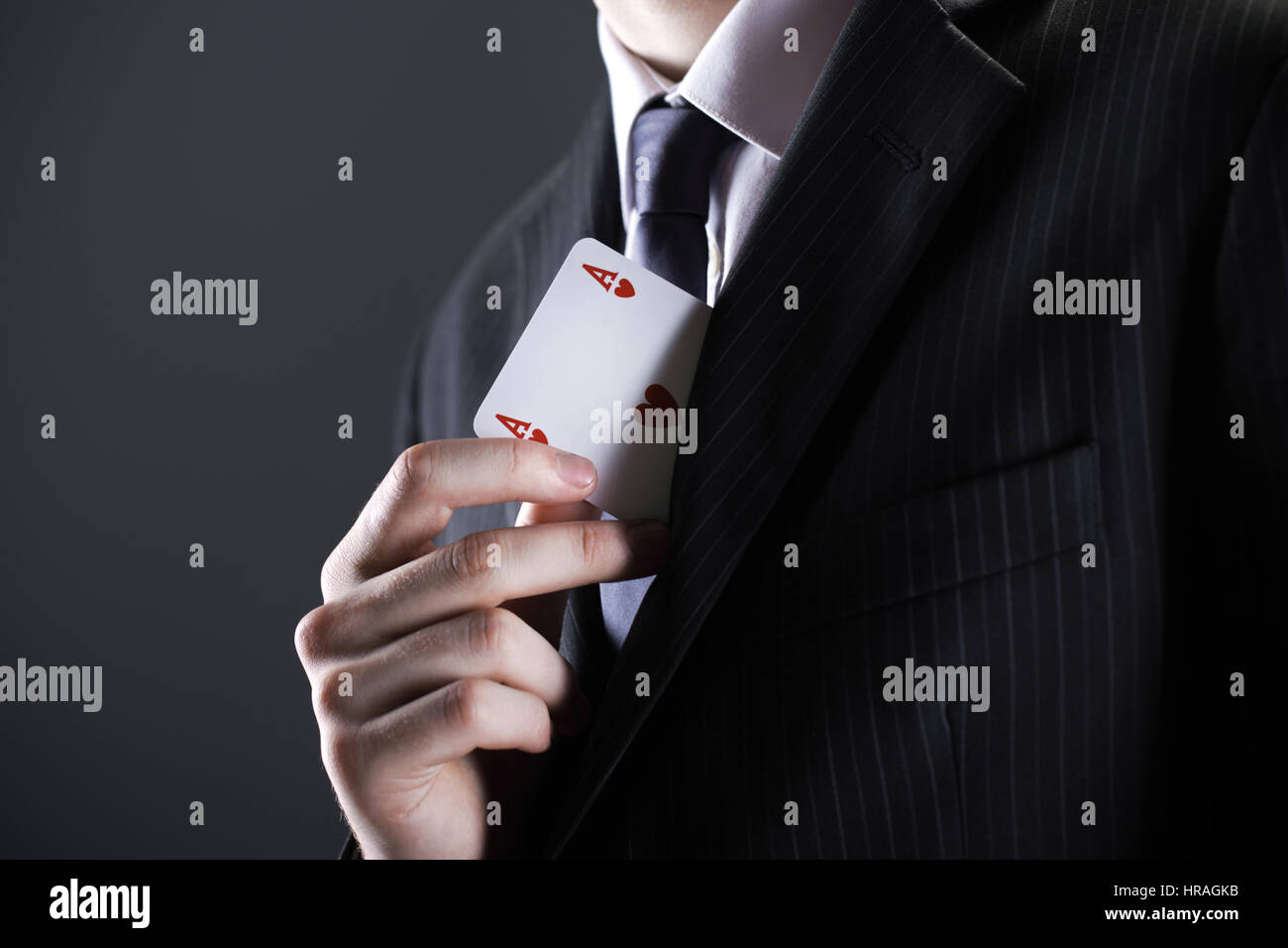 Hiding under jacket hi-res stock photography and images - Alamy