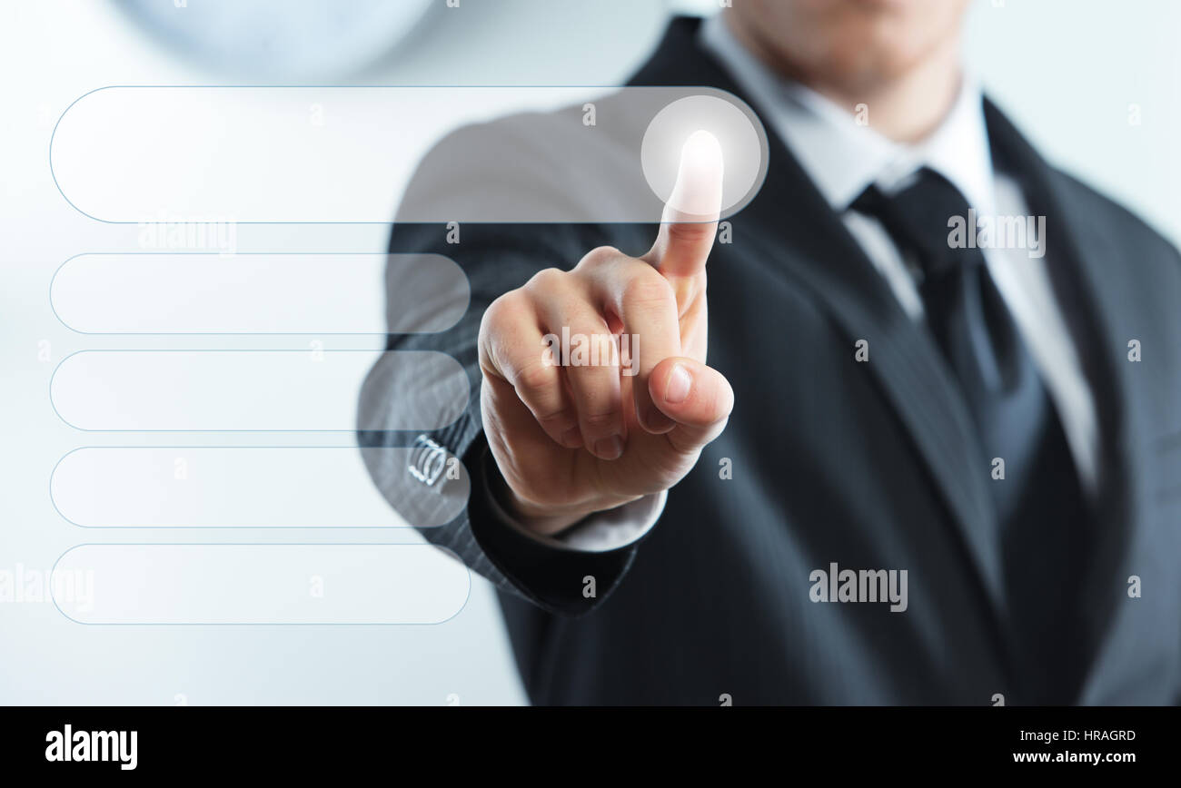 Businessman finger touches virtual buttons Stock Photo - Alamy