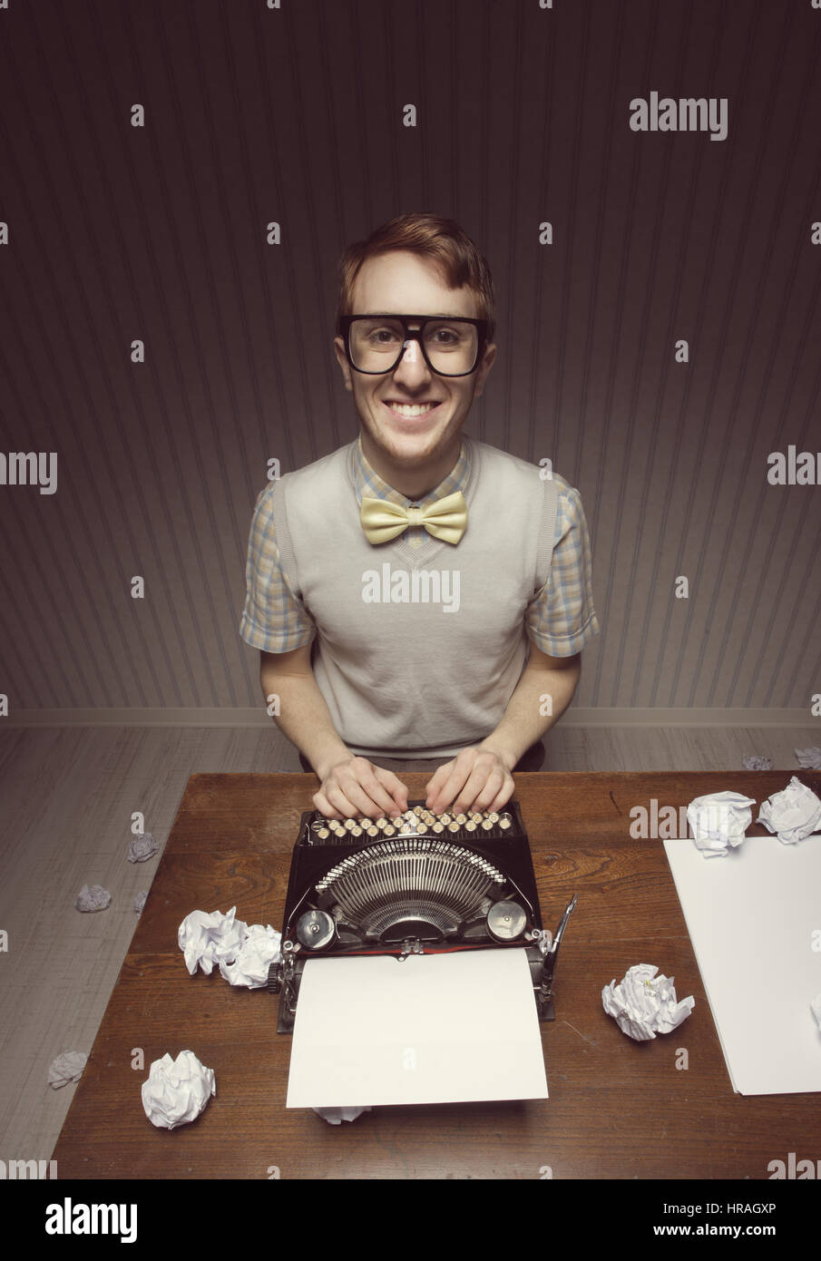 Nerd student journalist and his typewriter Stock Photo - Alamy