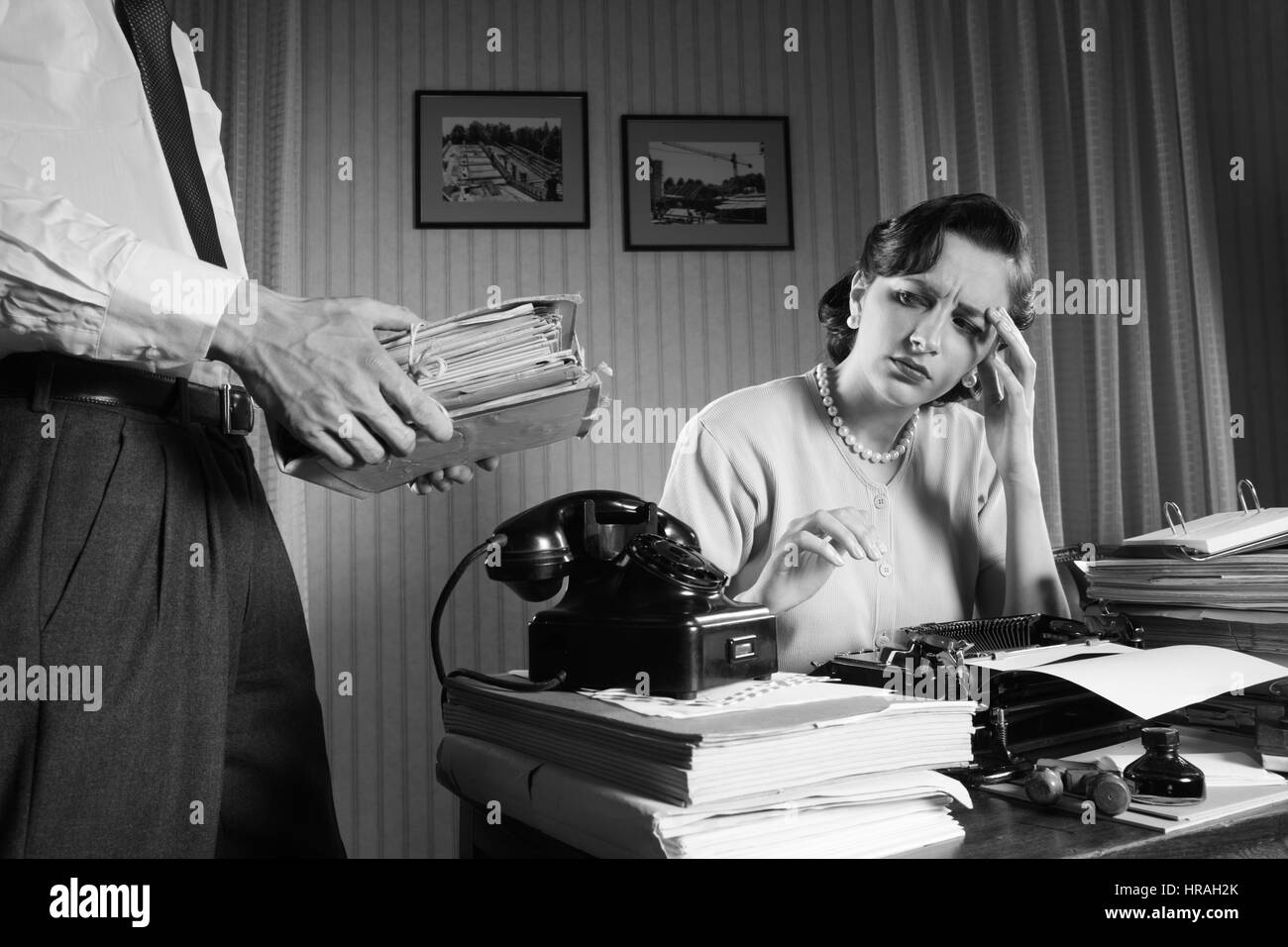 Stressed businesswoman with a too much paperwork and documents Stock ...